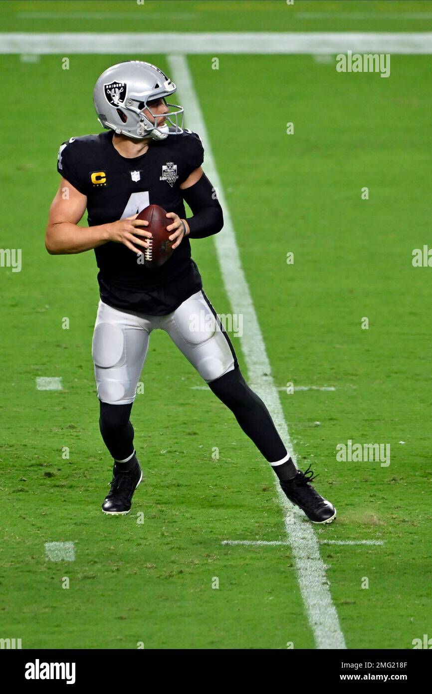 Las Vegas Raiders quarterback Derek Carr (4) looks to pass against the ...