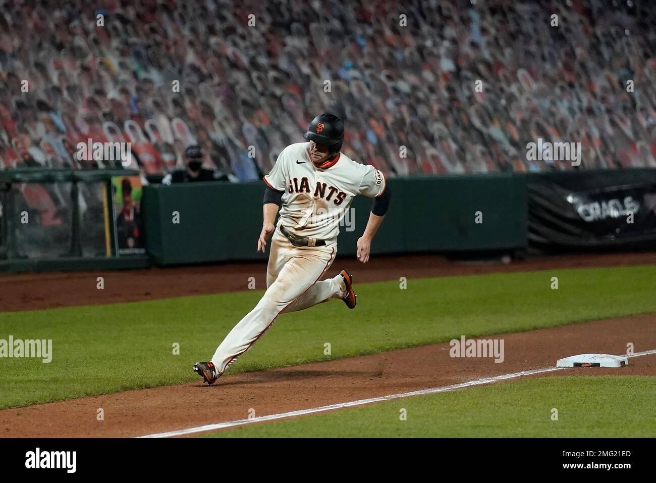 San Francisco Giants' Austin Slater rounds third base on the way to ...