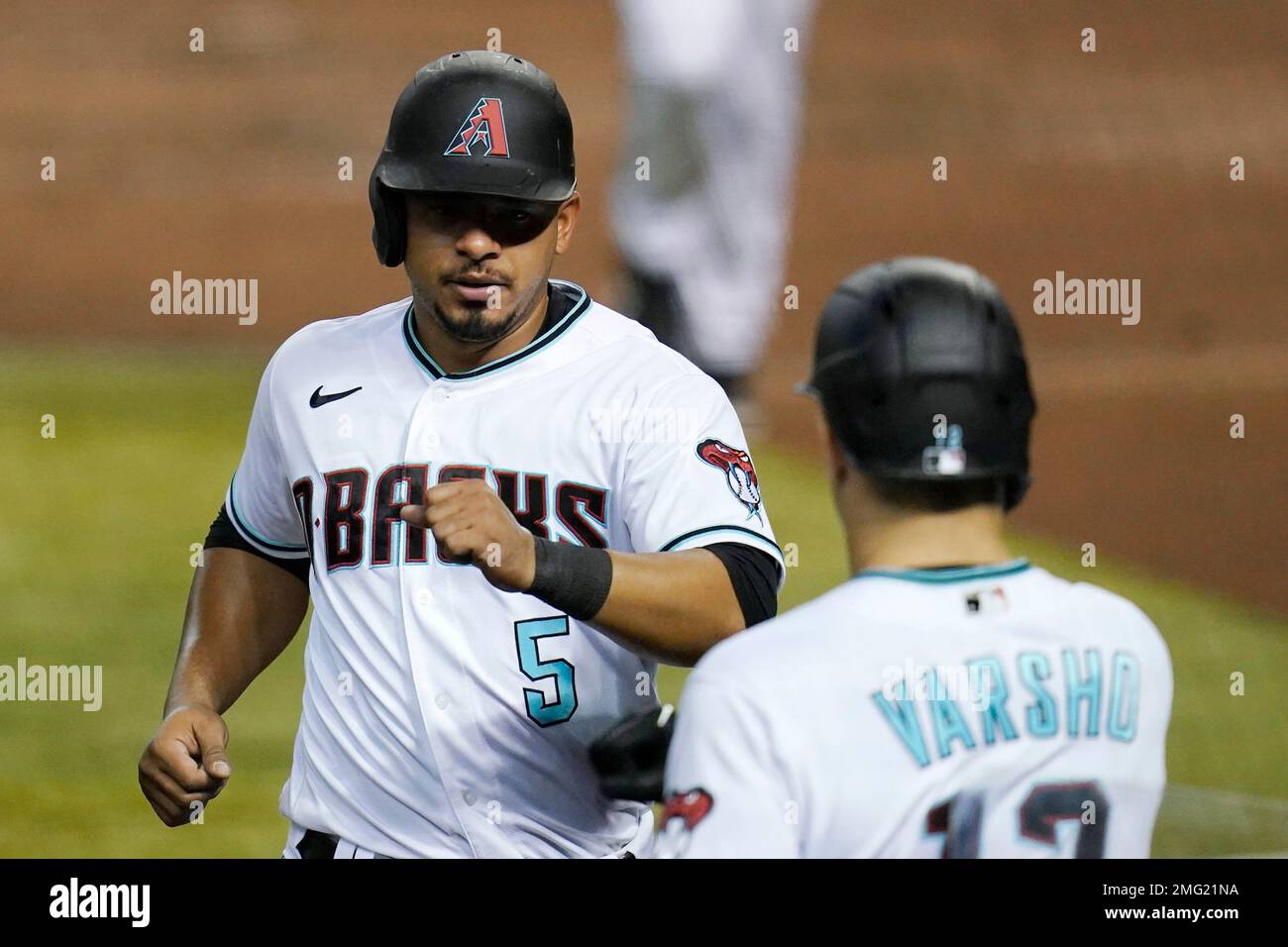 Arizona Diamondbacks' Eduardo Escobar (5) with Daulton Varsho after ...