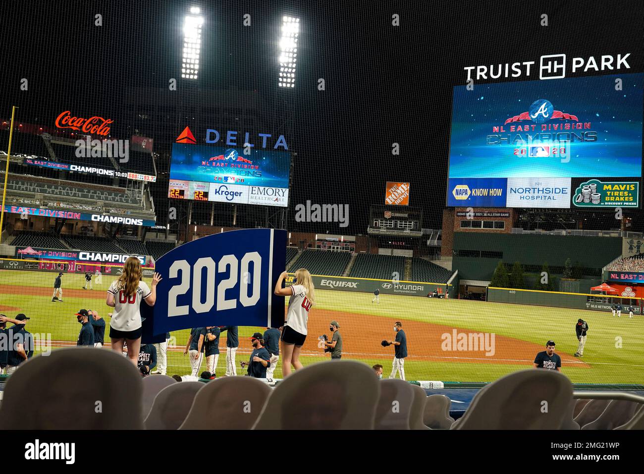 The Atlanta Braves celebrate after a baseball game to clinch the NL ...