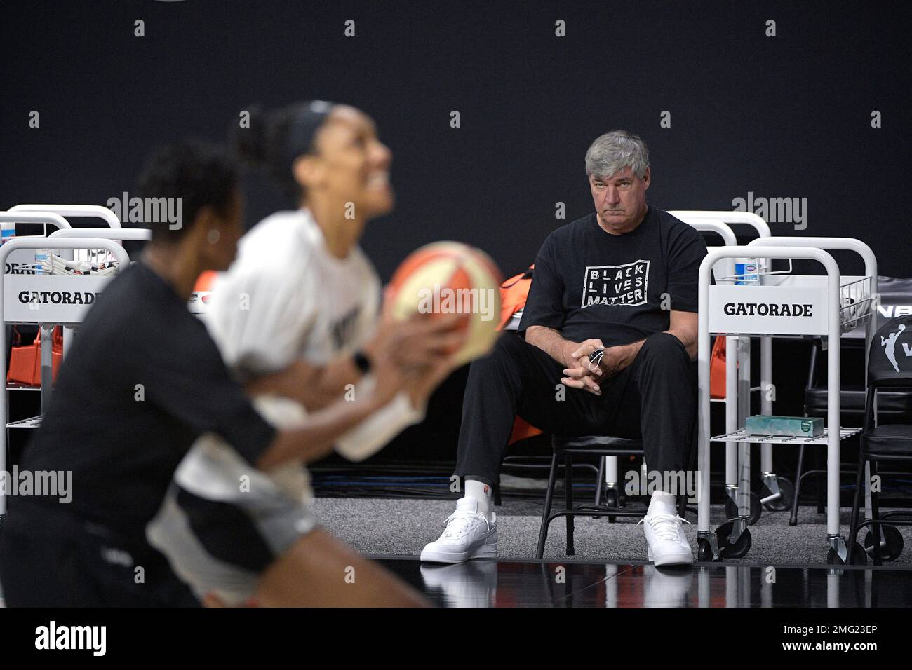 Las Vegas Aces head coach Bill Laimbeer, right, watches as center A'ja ...