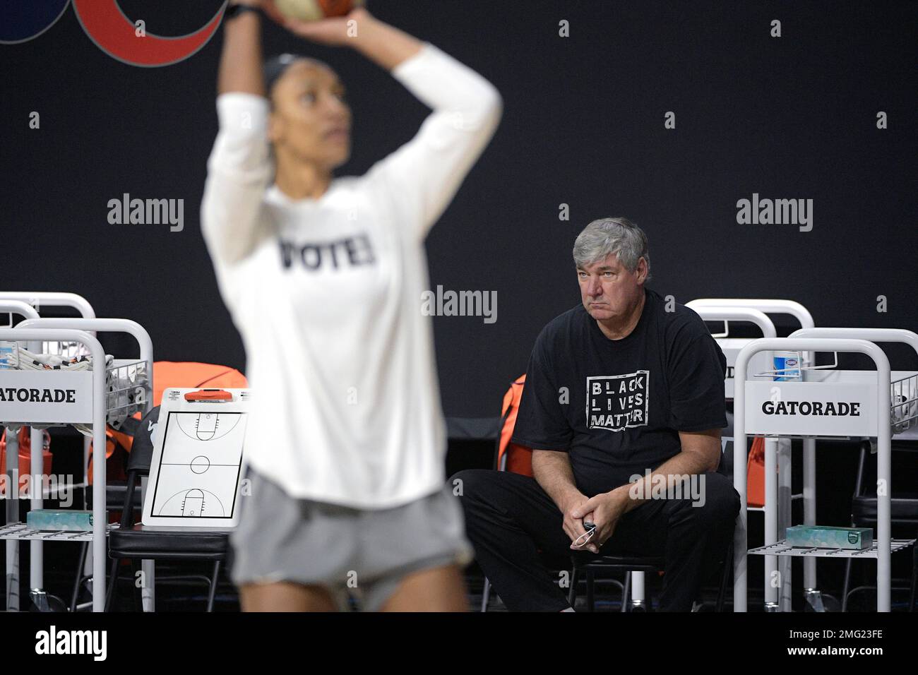 Las Vegas Aces head coach Bill Laimbeer, right, watches as center A'ja ...