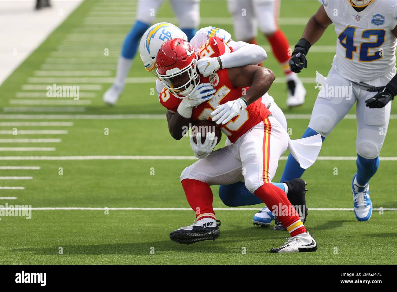 Kansas City Chiefs running back Clyde Edwards-Helaire (25) fights for ...