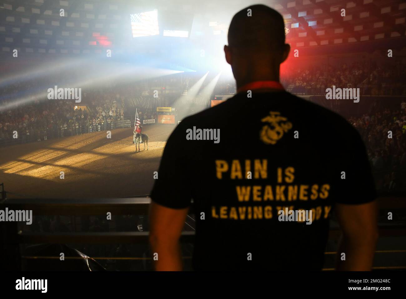 U.S. Marine Corps Staff Sgt. Justin Lundy stands at attention for the ...