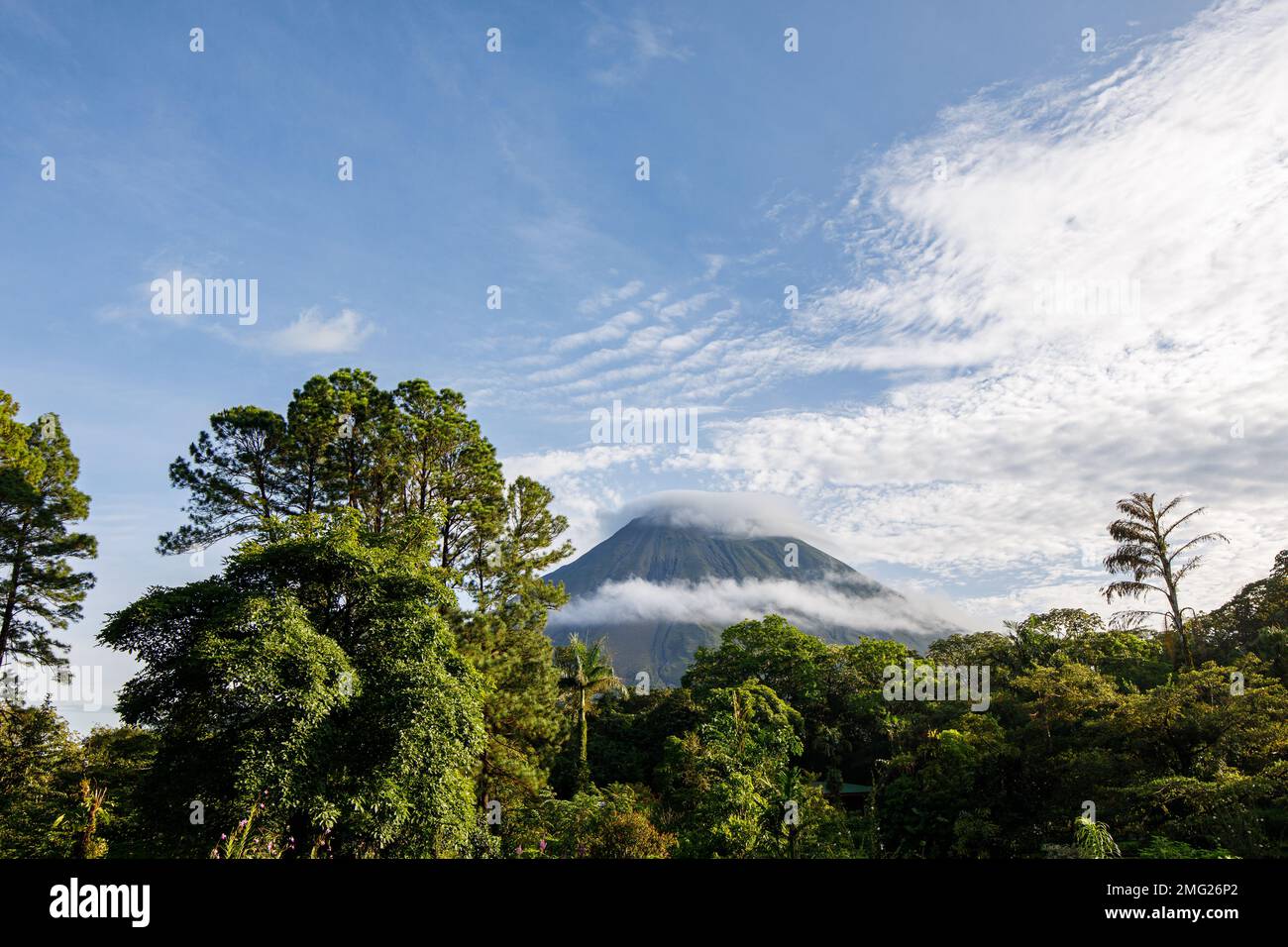 Primary and secondary tropical rainforests surround the Arenal Volcano ...