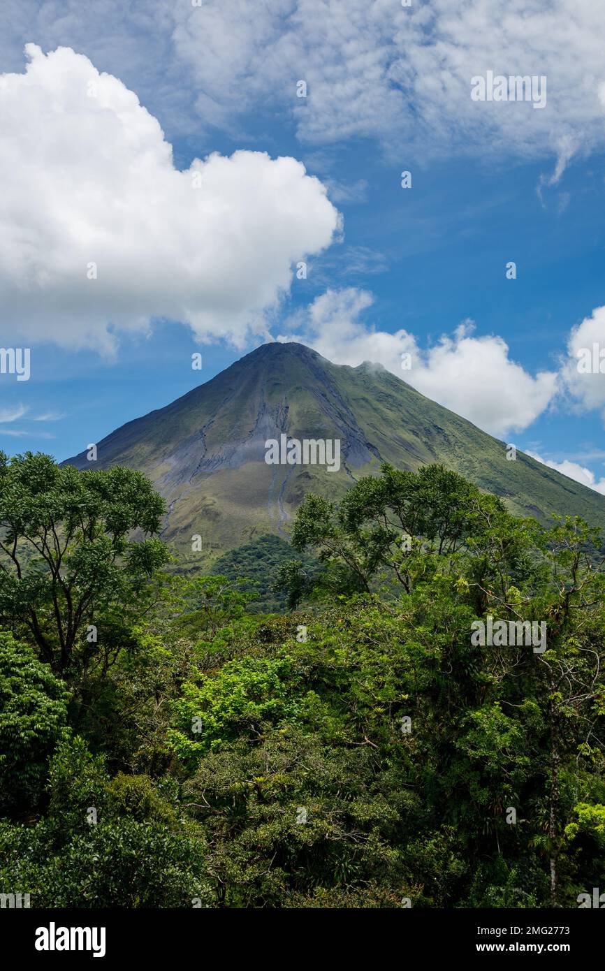 Primary and secondary tropical rainforests surround Arenal Volcano at ...