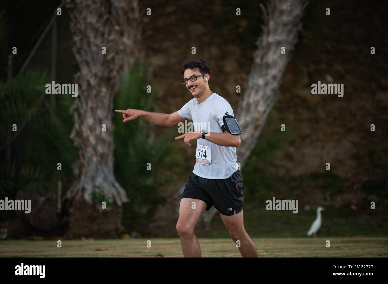 A runner participates in the 14th Annual Joint Base Pearl Harbor-Hickam ...