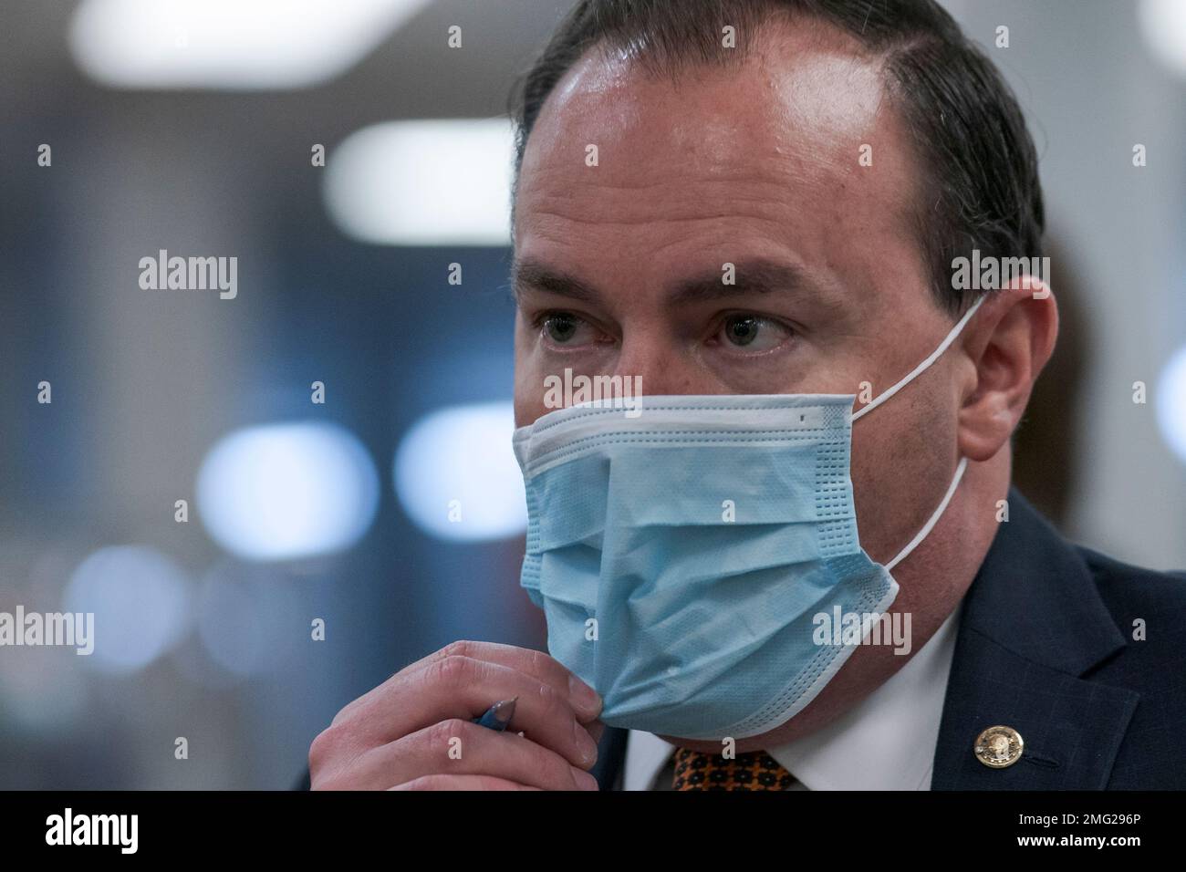 Sen. Mike Lee, R-Utah, arrives at the Capitol in Washington, Monday ...