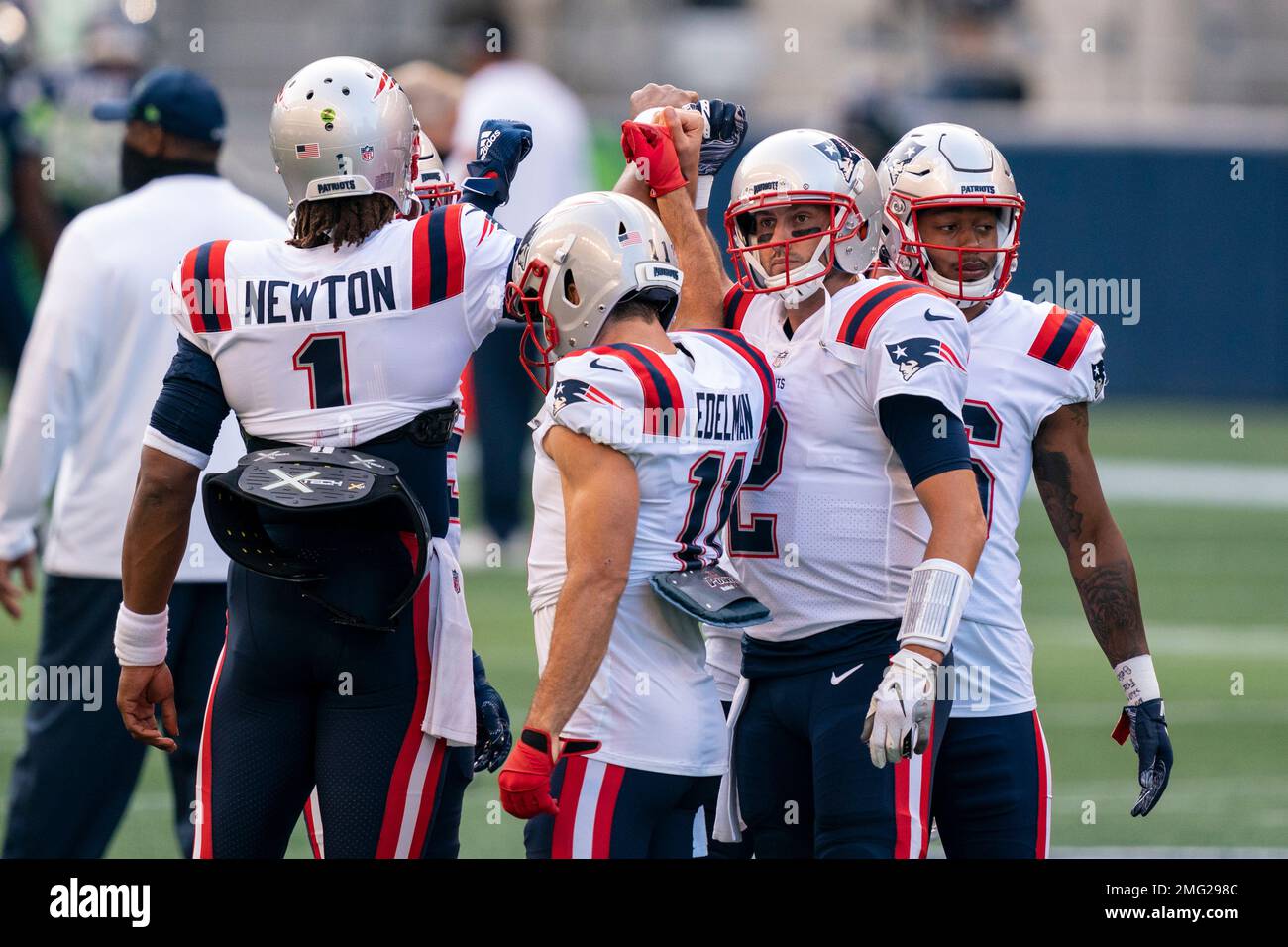 Members of the New England Patriots including quarterback Cam Newton ...