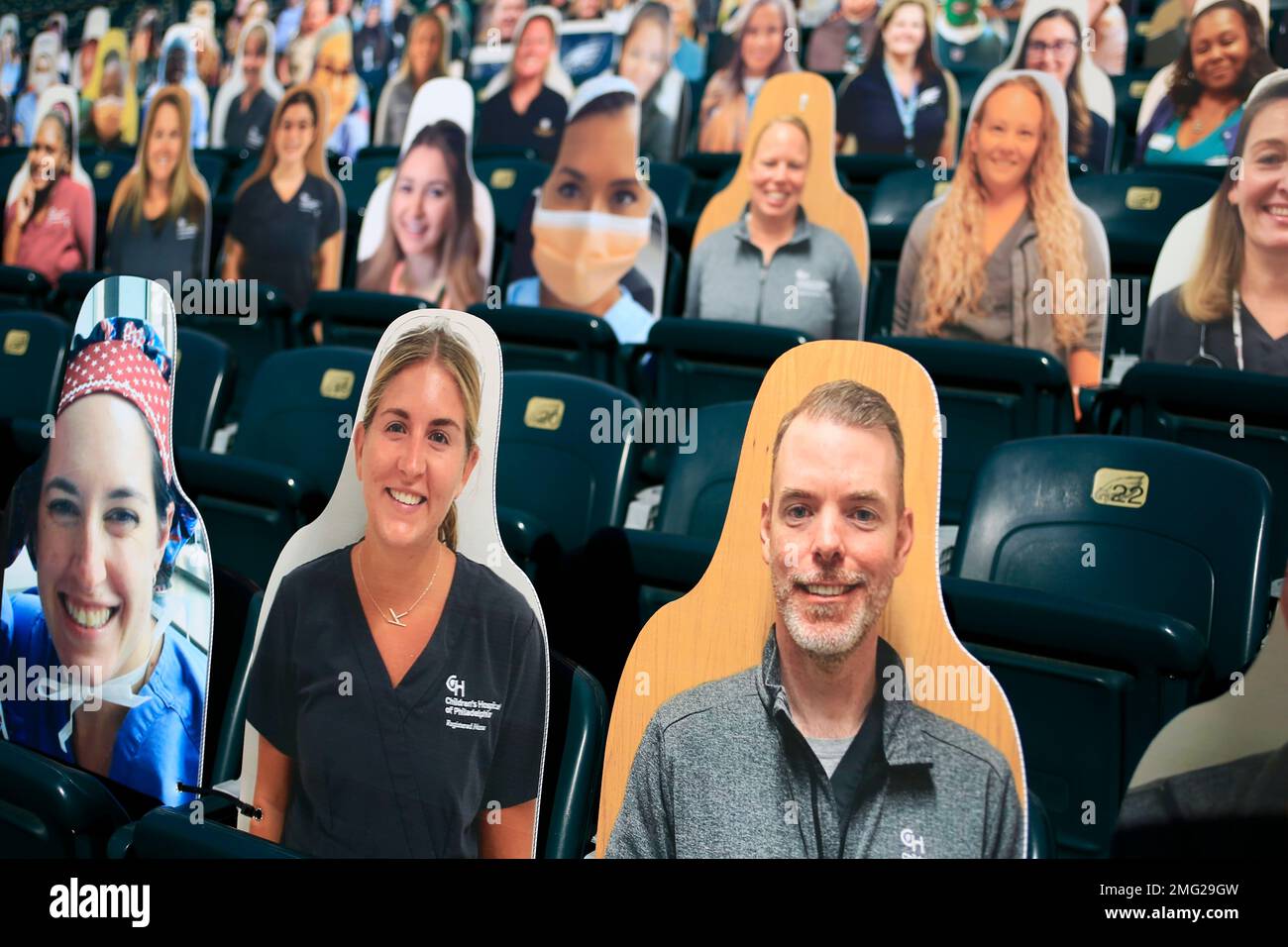 Cutouts of essential workers are shown after an NFL football game ...