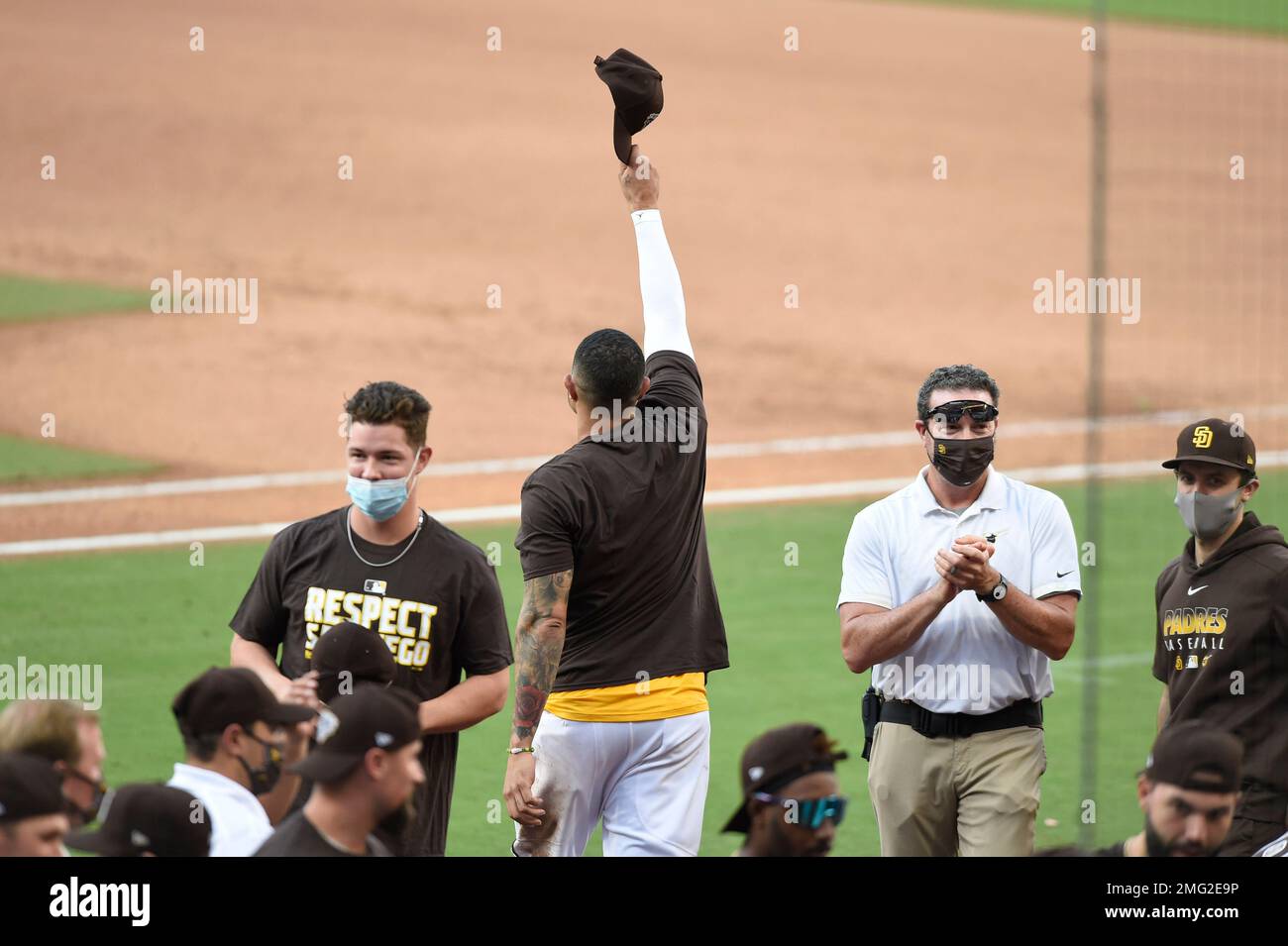 San Diego Padres' Manny Machado points out to fans on balconies after ...