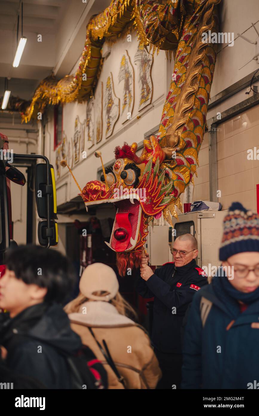 Fireman with Lunar New Year decoration at Soho Fire Station, London ...