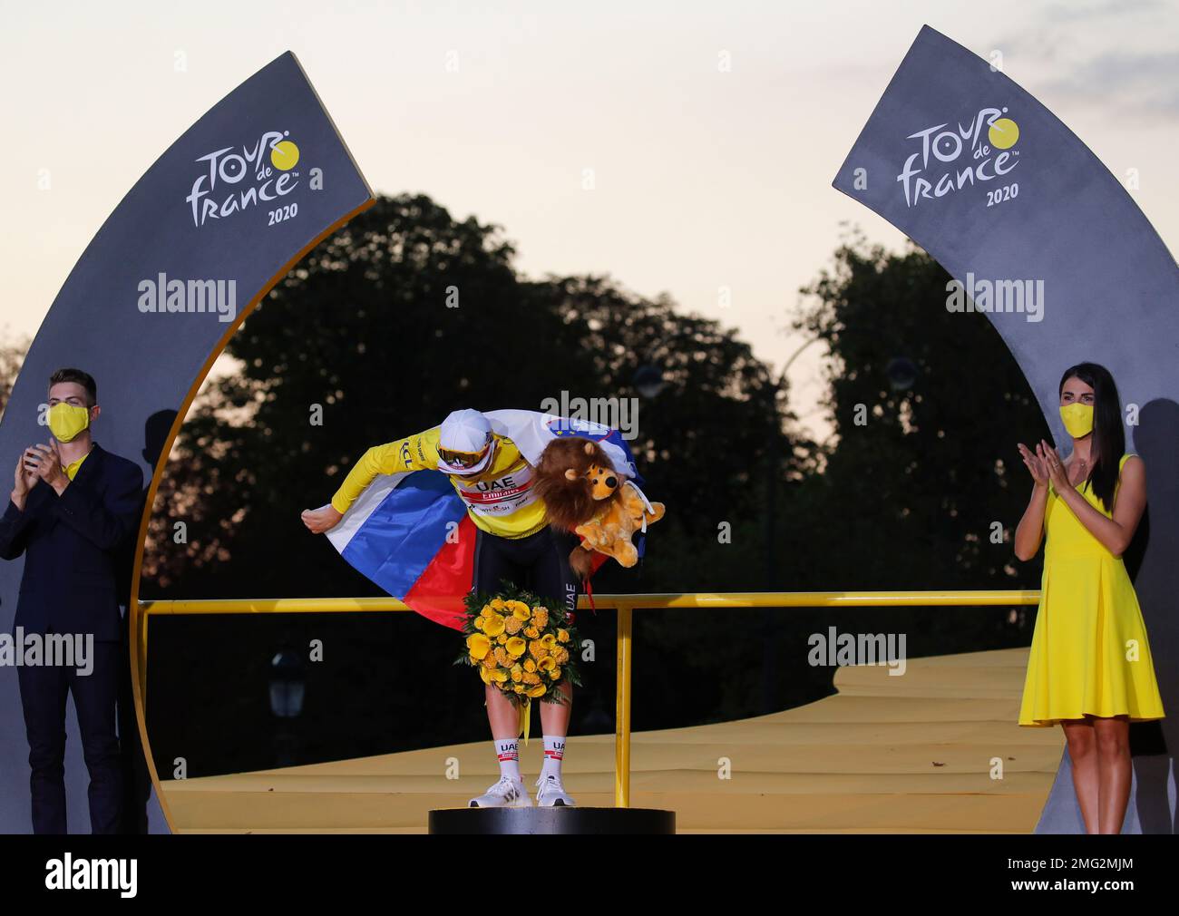 Tour de France winner Slovenia's Tadej Pogacar, wearing the overall ...