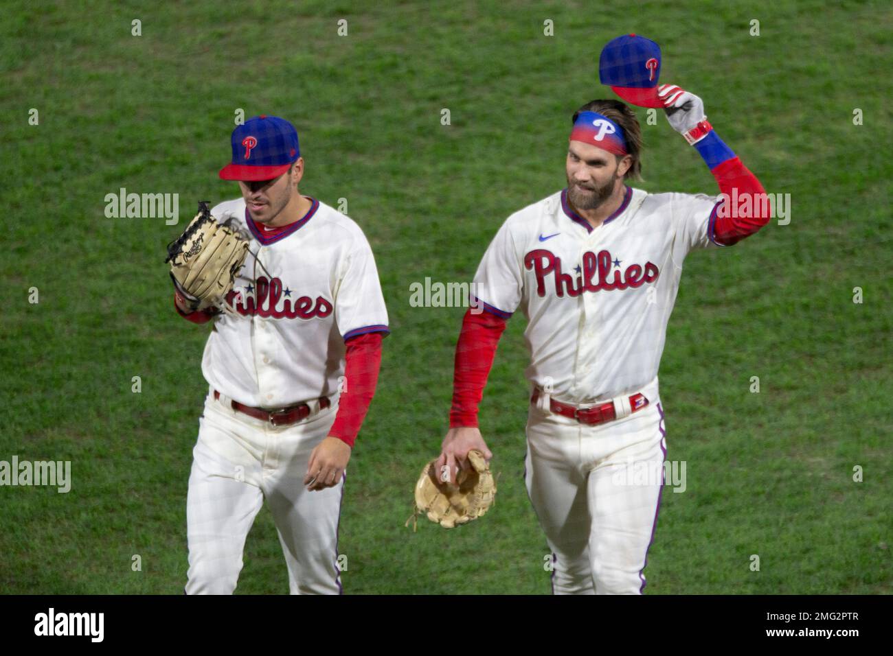 Philadelphia Phillies second baseman Phil Gosselin, left, and right ...