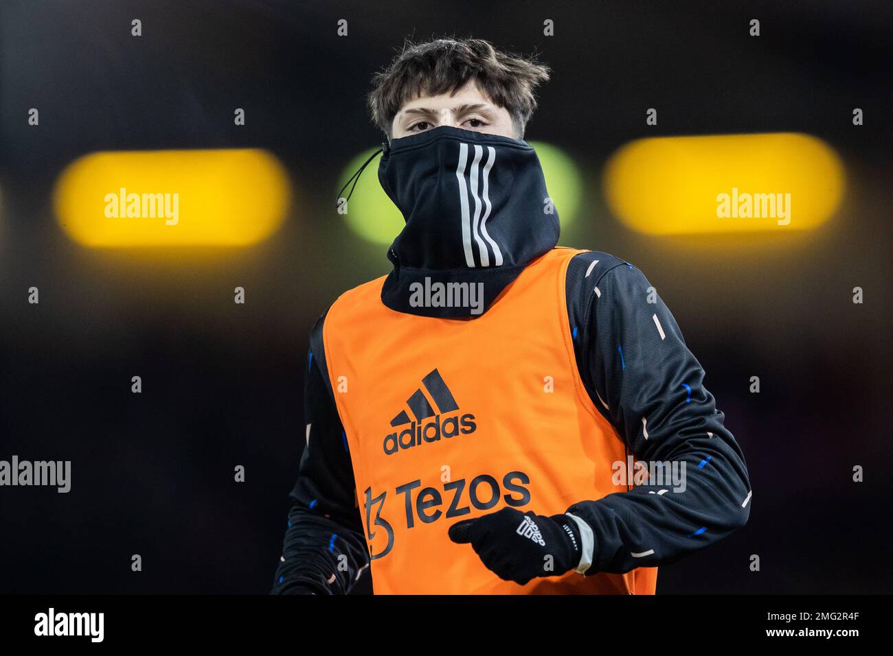 Alejandro Garnacho #49 of Manchester United warms up on the side line ...