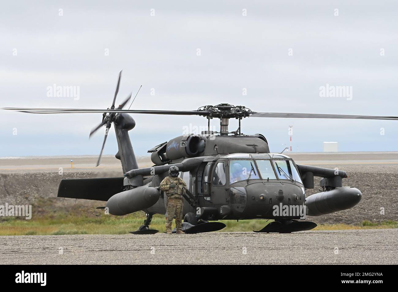 A UH-60 Black Hawk helicopter is ready for takeoff from the Deadhorse ...