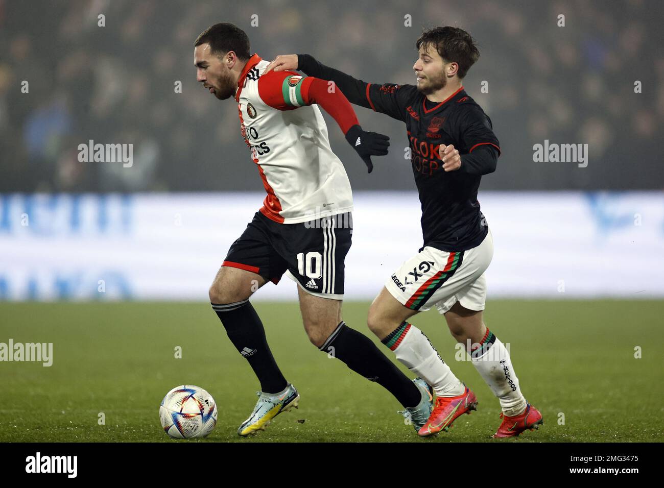 ROTTERDAM - (lr) Orkun Kokcu of Feyenoord, Dirk Propper of NEC Nijmegen during the Dutch premier ...