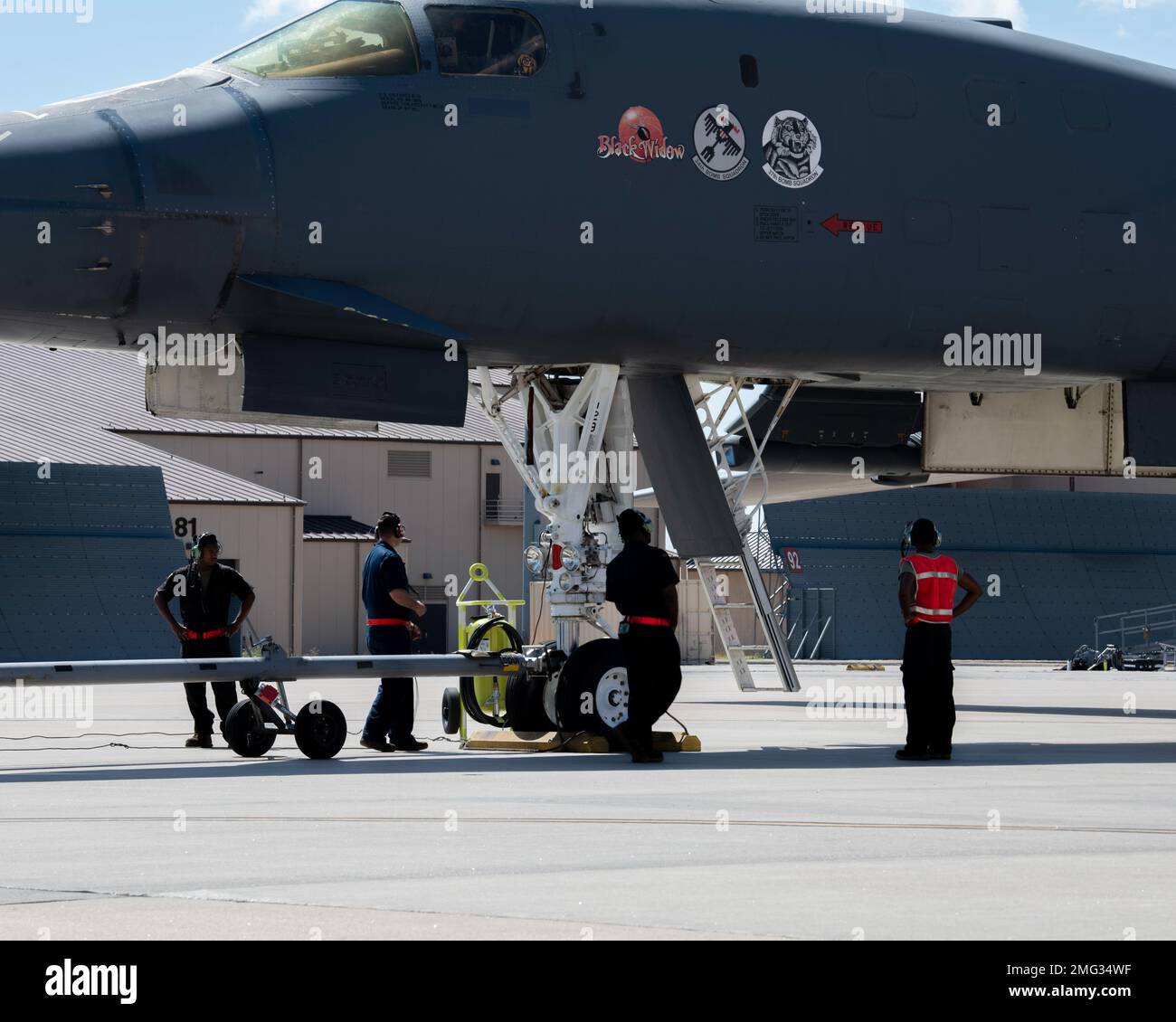 U.S. Air Force service members recover a B-1B Lancer at Ellsworth Air ...