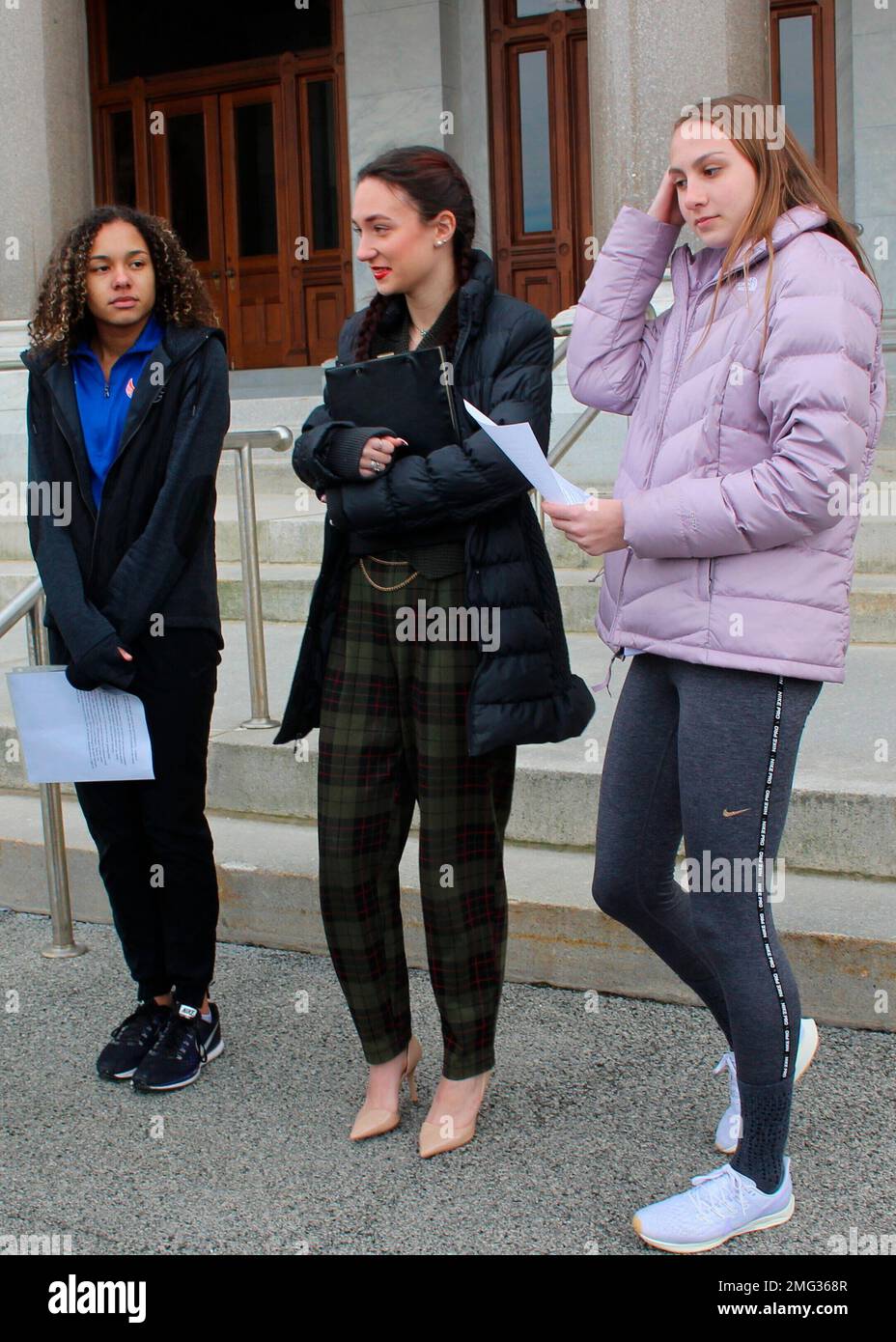 FILE - In this Feb. 12, 2020 file photo, high school track athletes ...