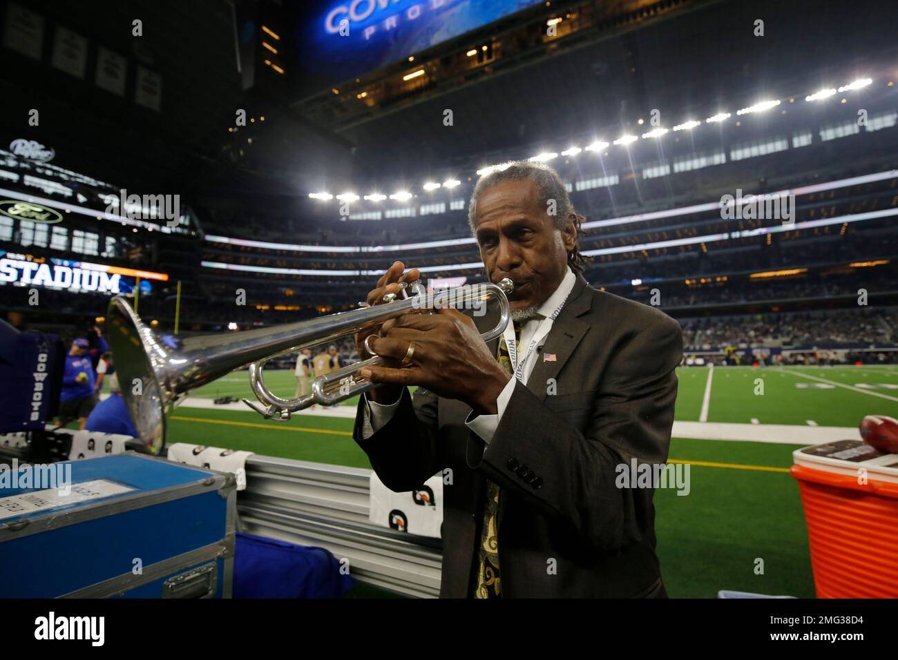 Jazz trumpet player Freddie Jones plays the national anthem before an ...