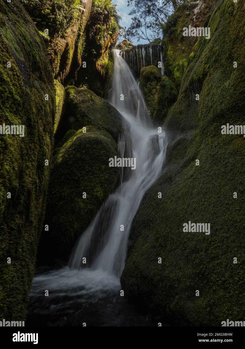 Long exposure of small freshwater river stream cascade waterfall ...