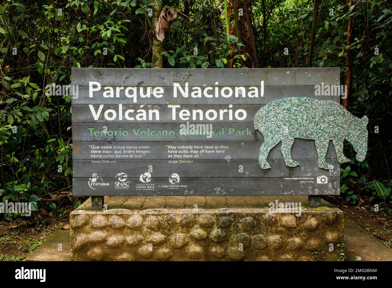 Entrance sign along the trail at the Tenorio Volcano National Park ...