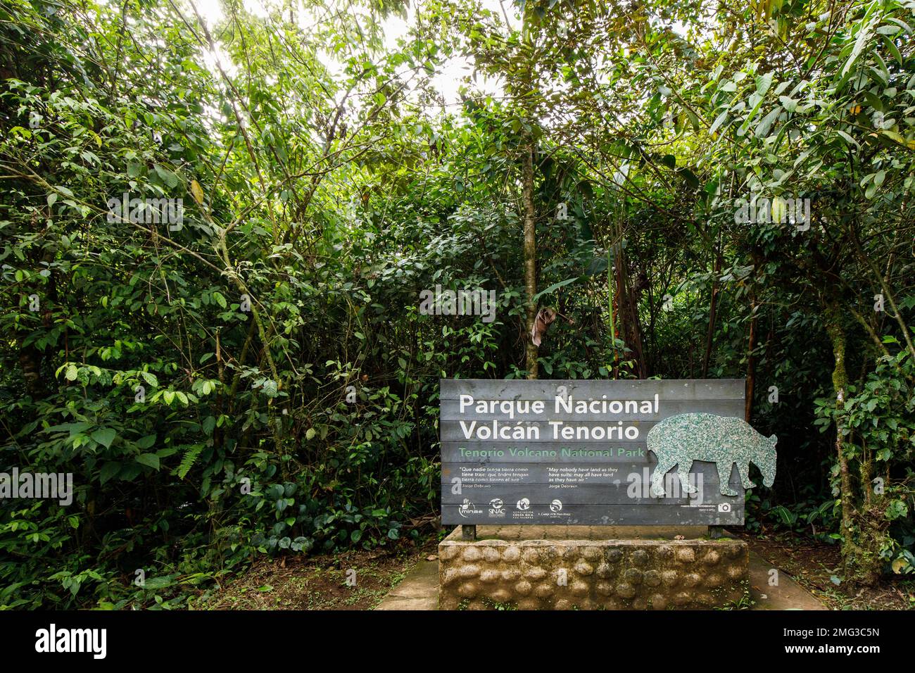 Entrance sign along the trail at the Tenorio Volcano National Park ...