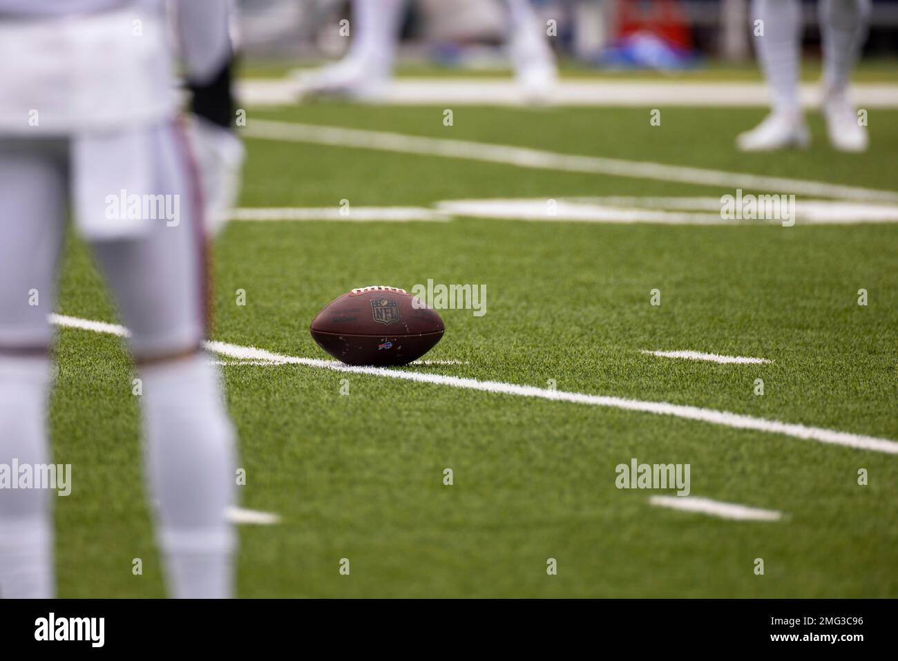 Detail view of a Buffalo Bills marked Wilson NFL football on the field ...
