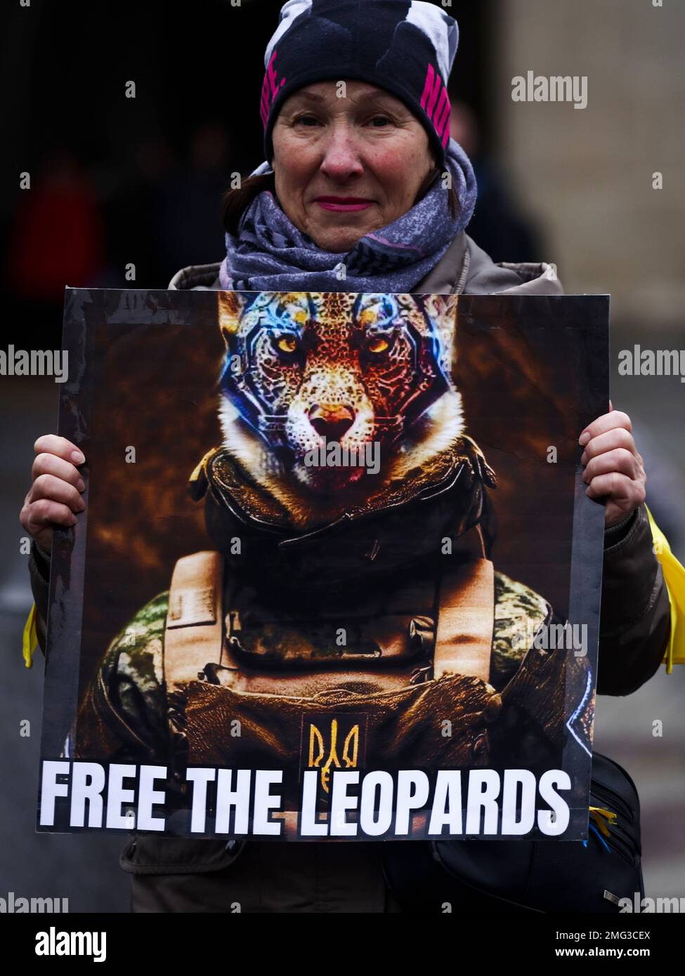 Krakow, Poland. 25th Jan, 2023. A woman holds 'Free The Leopards ...