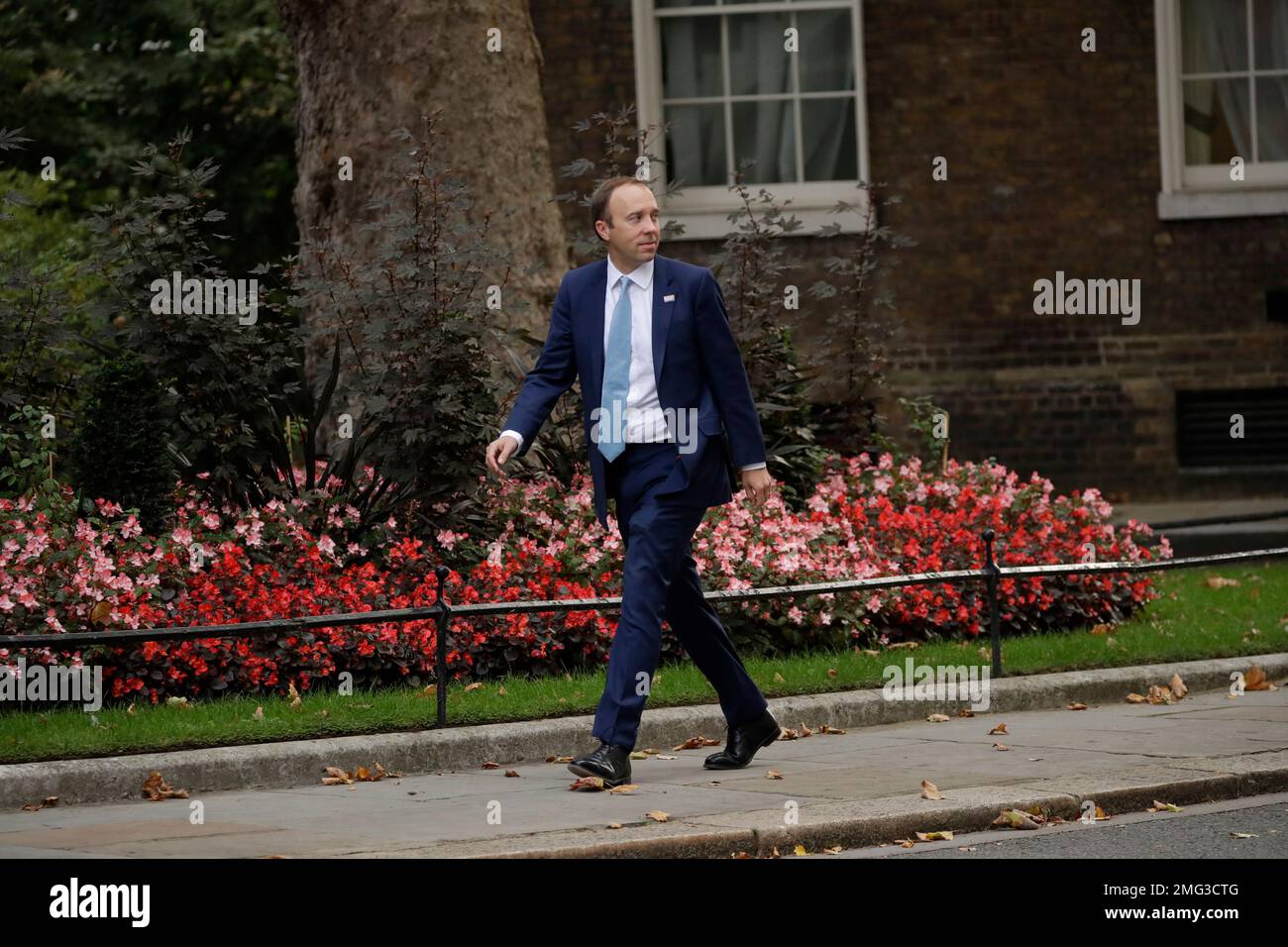 British Health Secretary Matt Hancock walks to 10 Downing Street in ...