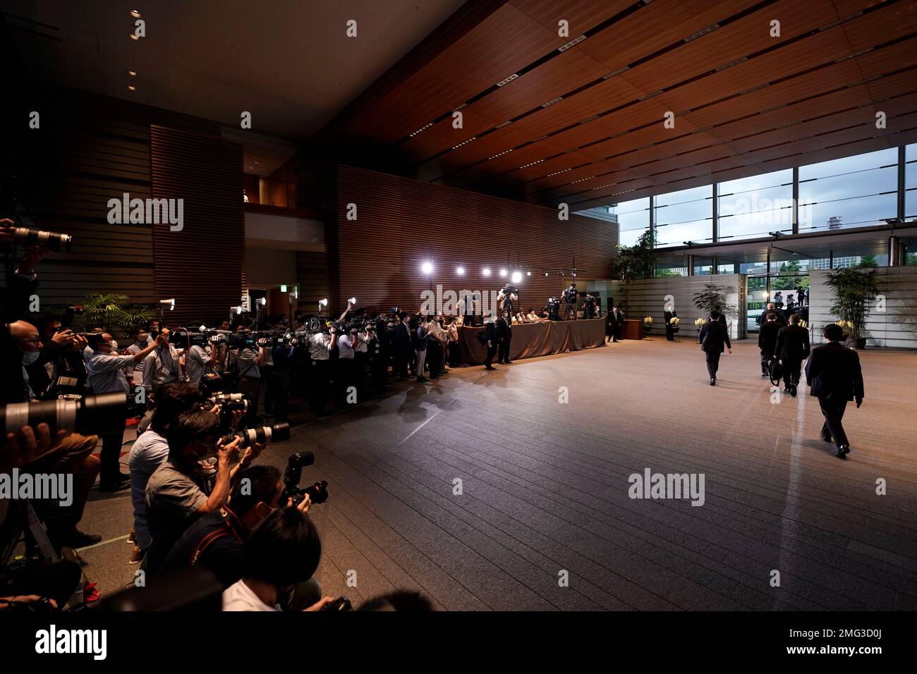 Japan's Prime Minister-elect Yoshihide Suga leaves his official ...