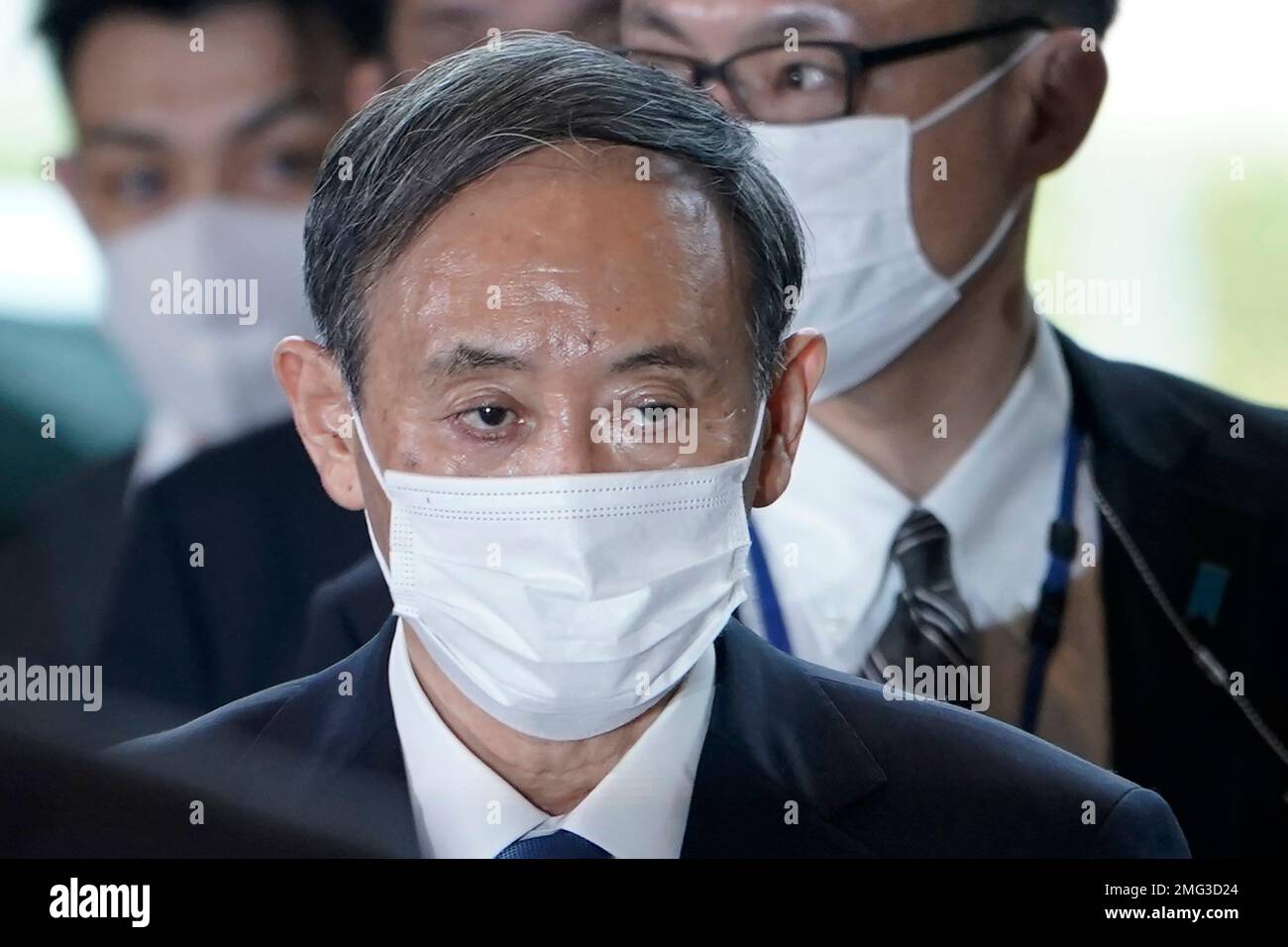 Yoshihide Suga arrives at the prime minister's office after being ...