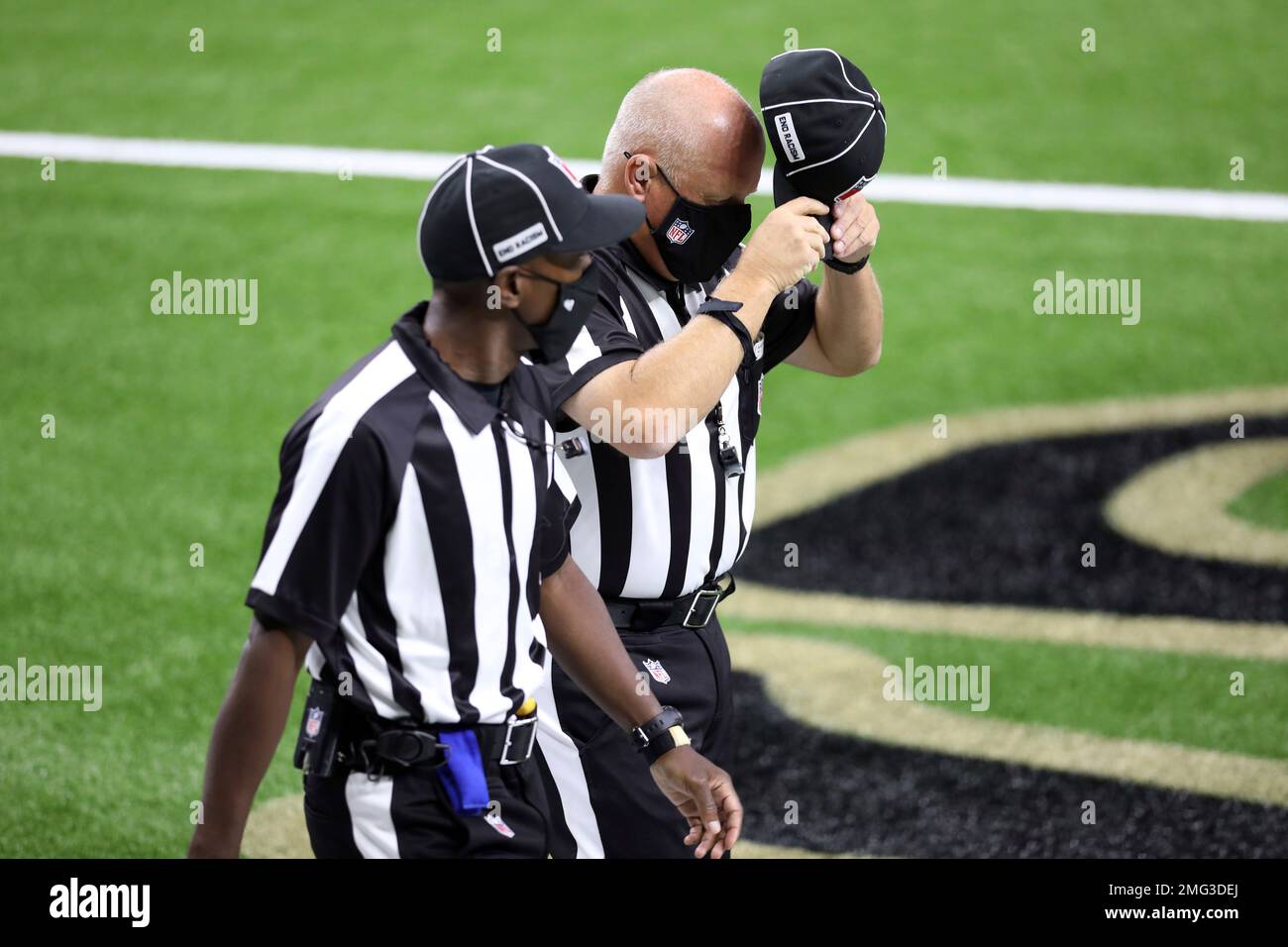 Officials are seen before an NFL football game between the Tampa Bay ...