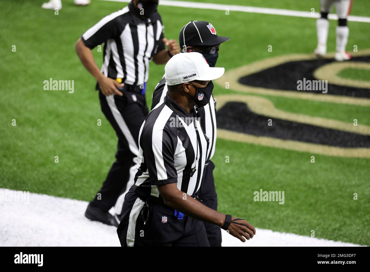 Referee Jerome Boger (23) and his officiating crew before an NFL ...