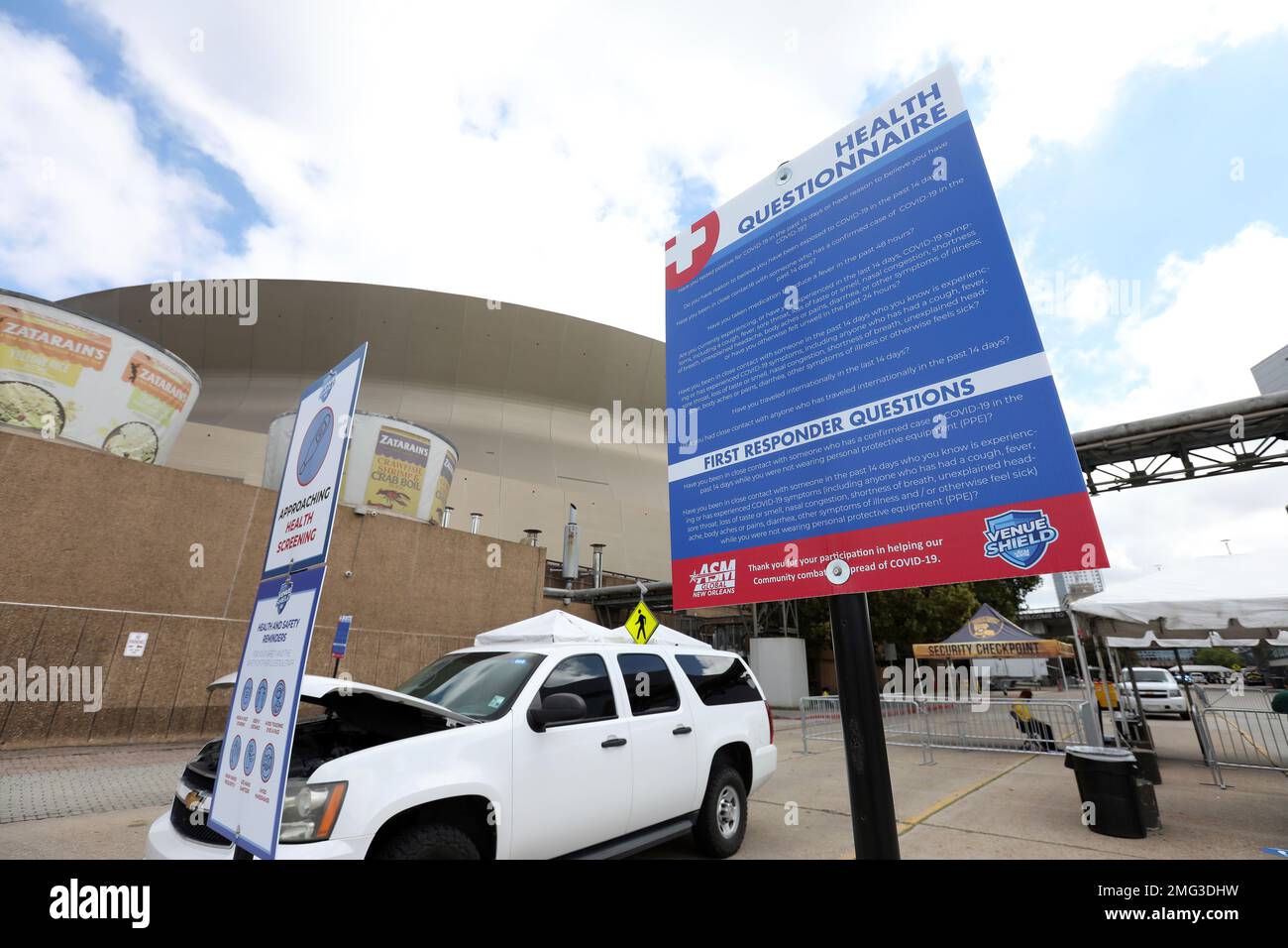 A health screening sign is seen outside of the Mercedes-Benz Superdome ...
