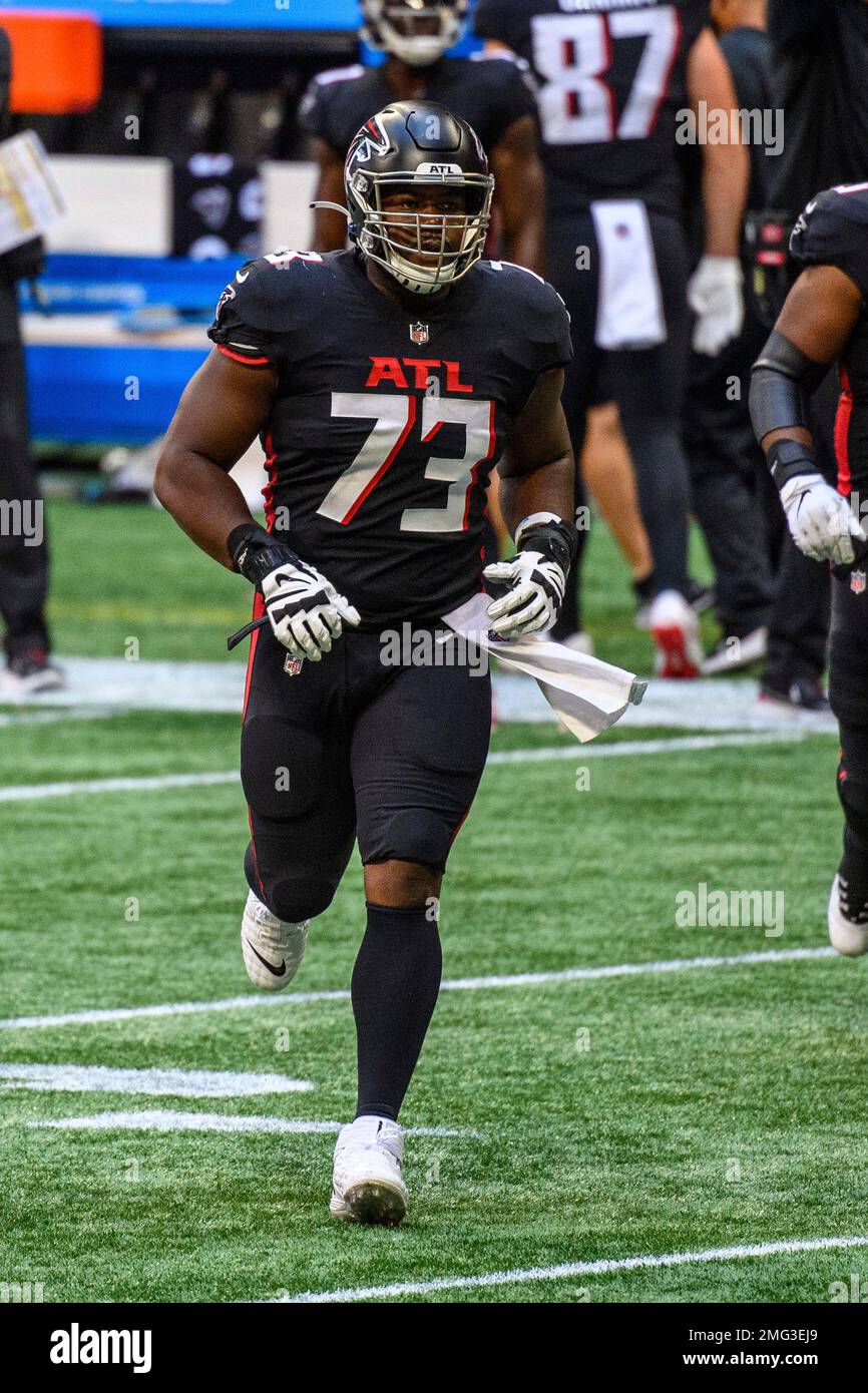 Atlanta Falcons offensive tackle Matt Gono (73) runs onto the field ...