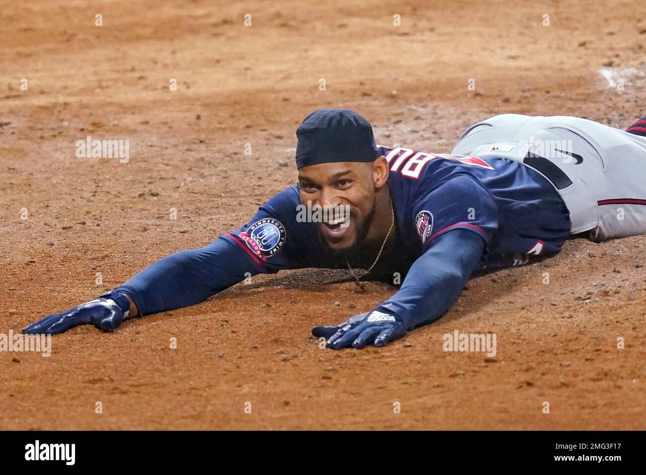 Minnesota Twins' Byron Buxton smiles after scoring on an inside-the ...