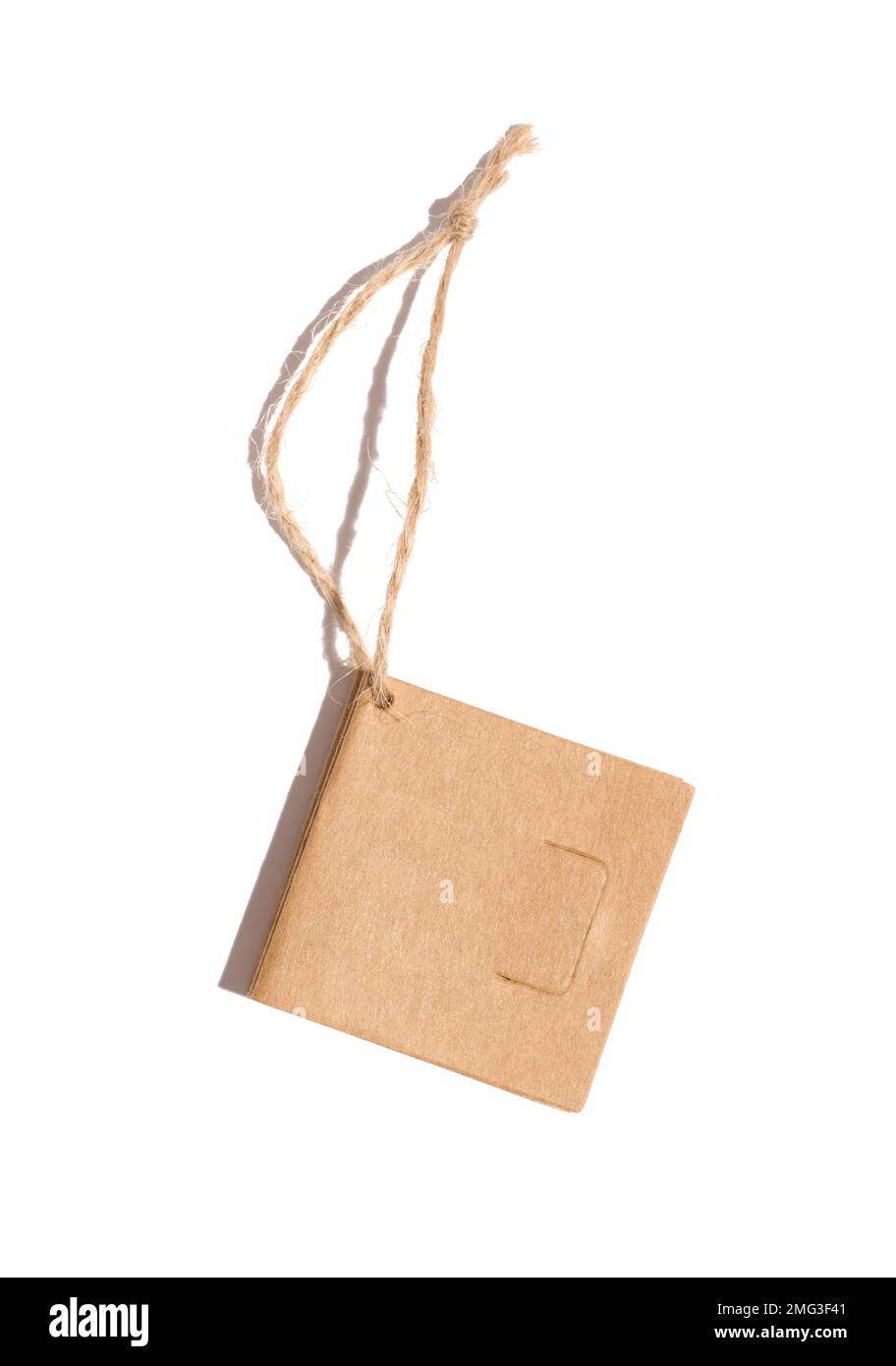 Brown paper square paper tag with a rope on a white isolated background ...