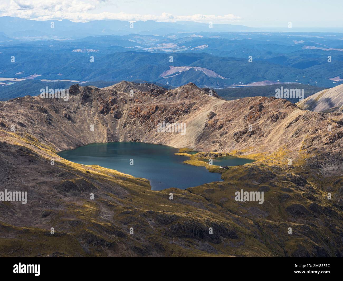 Scenic mountain panorama of idyllic alpine Angelus Hut on lake shore in ...