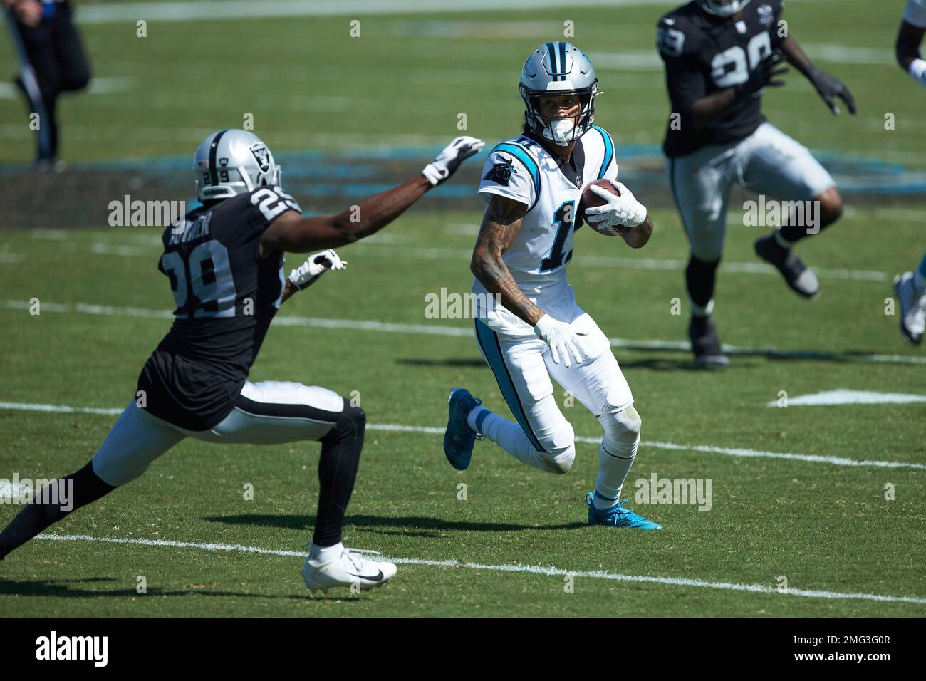 Carolina Panthers wide receiver Robby Anderson (11) looks to avoid the ...