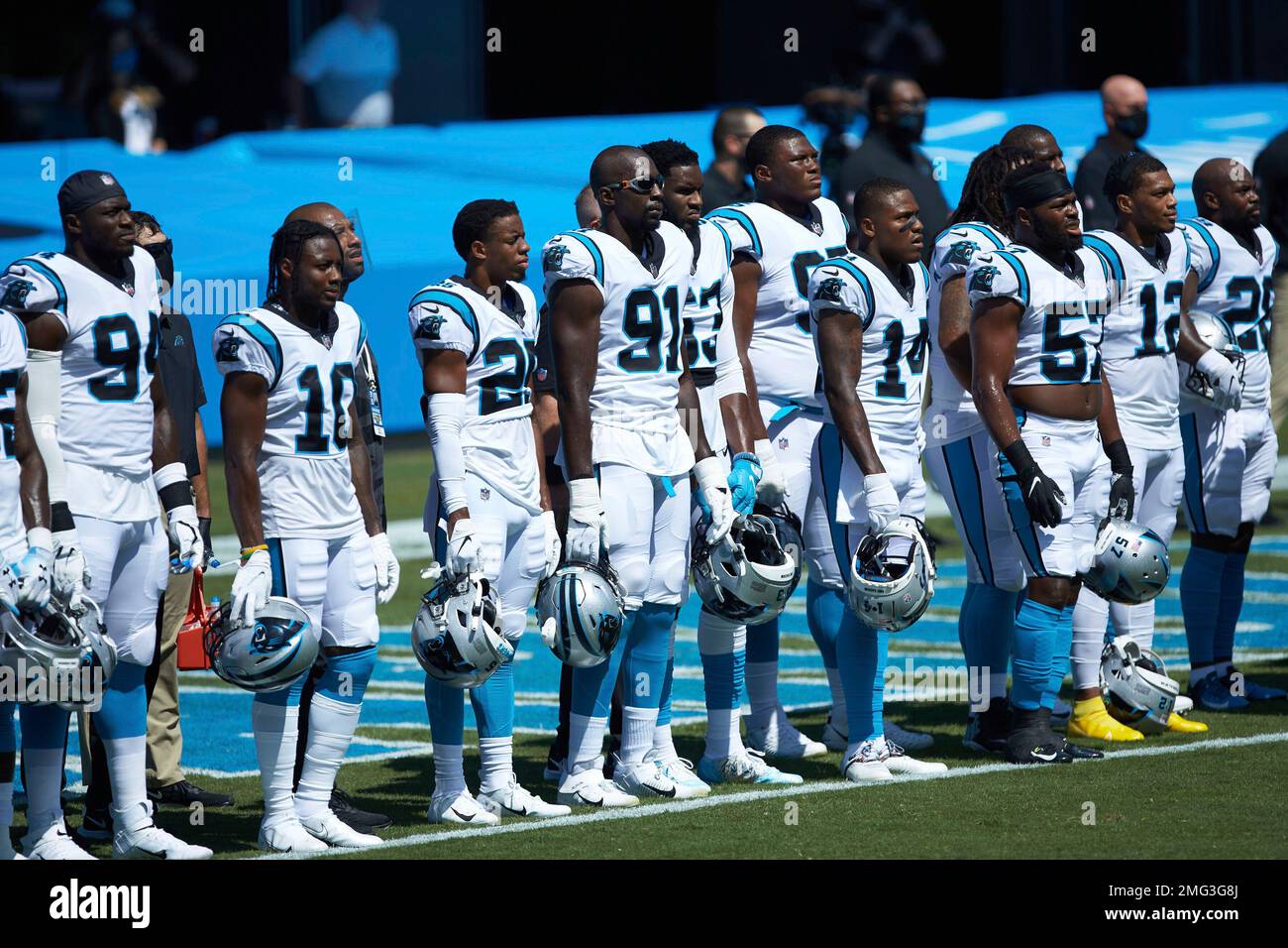 Members of the Carolina Panthers lineup during the playing of "Lift Ev ...