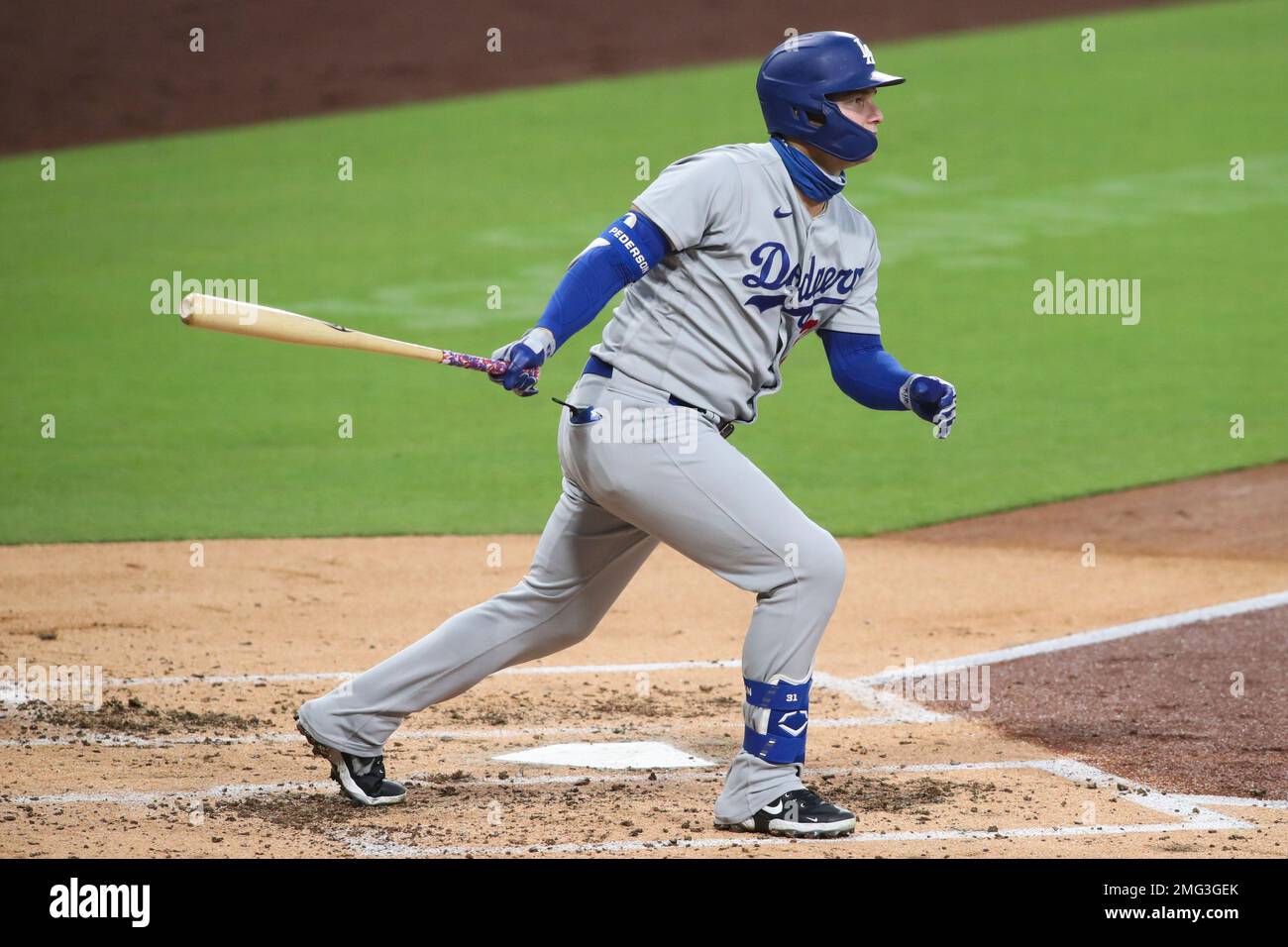 Los Angeles Dodgers' Joc Pederson makes contact with the ball against ...