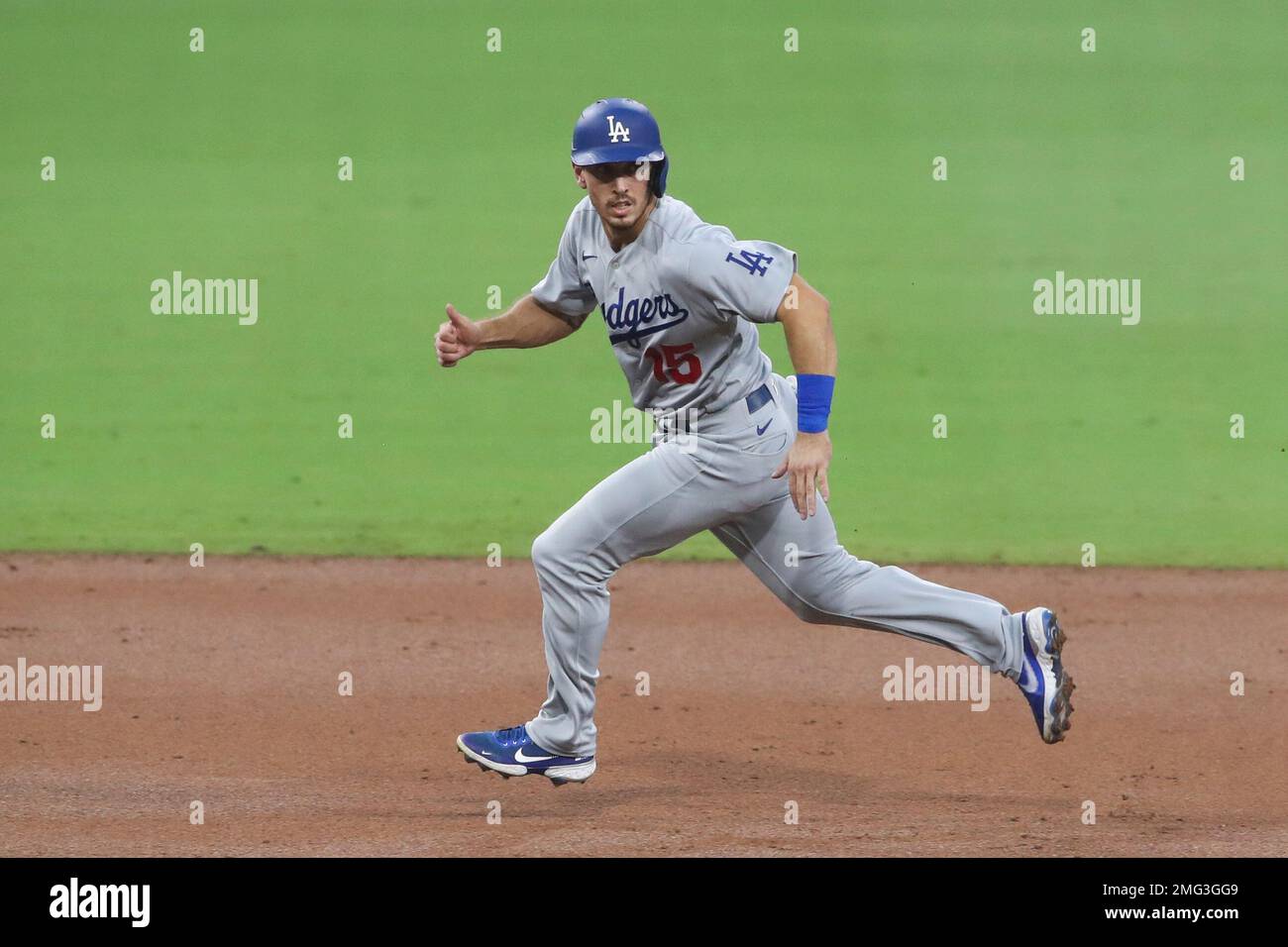 Los Angeles Dodgers' Austin Barnes rounds second on his way to third ...