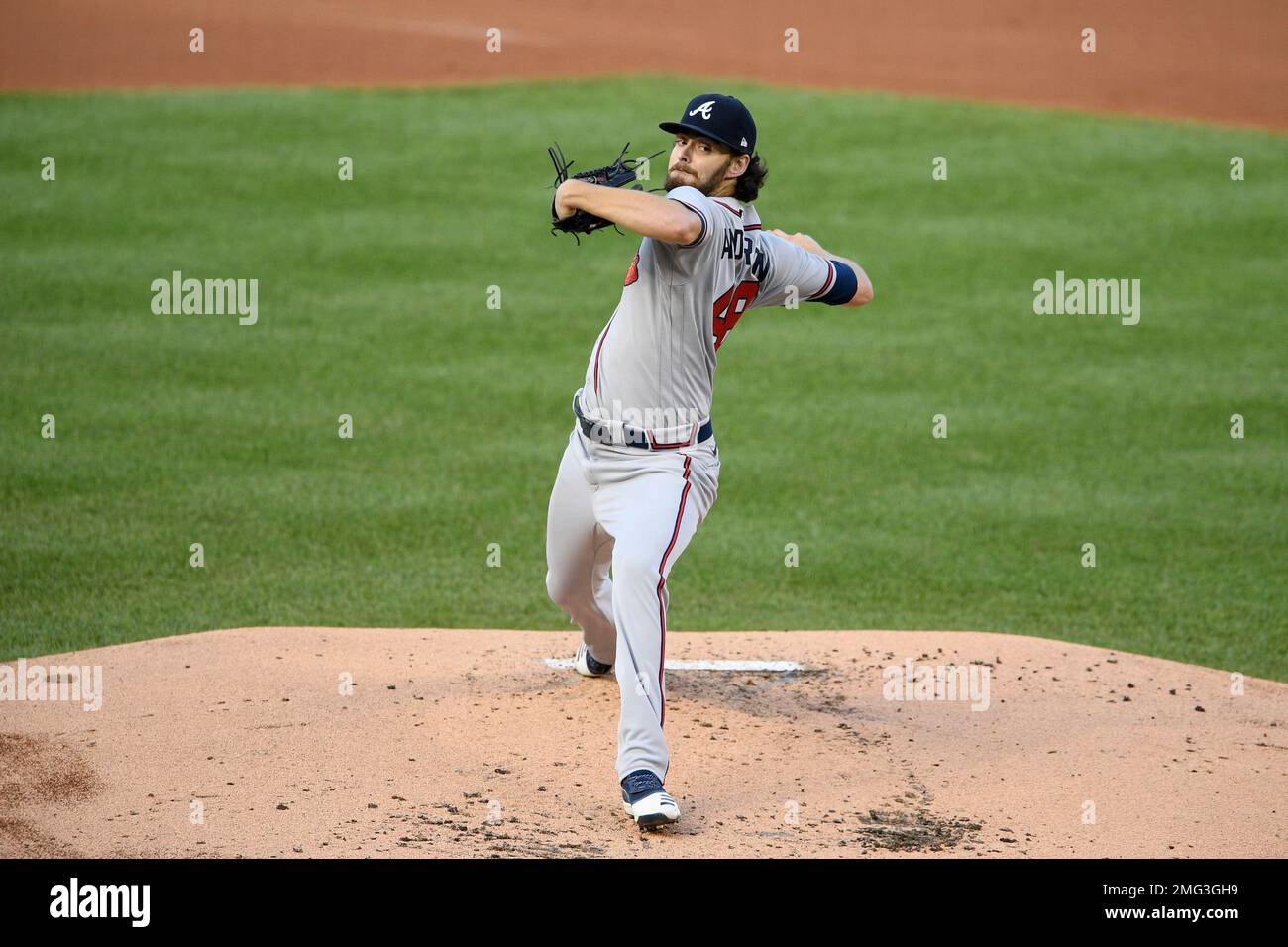 Atlanta Braves starting pitcher Ian Anderson delivers a pitch during a ...