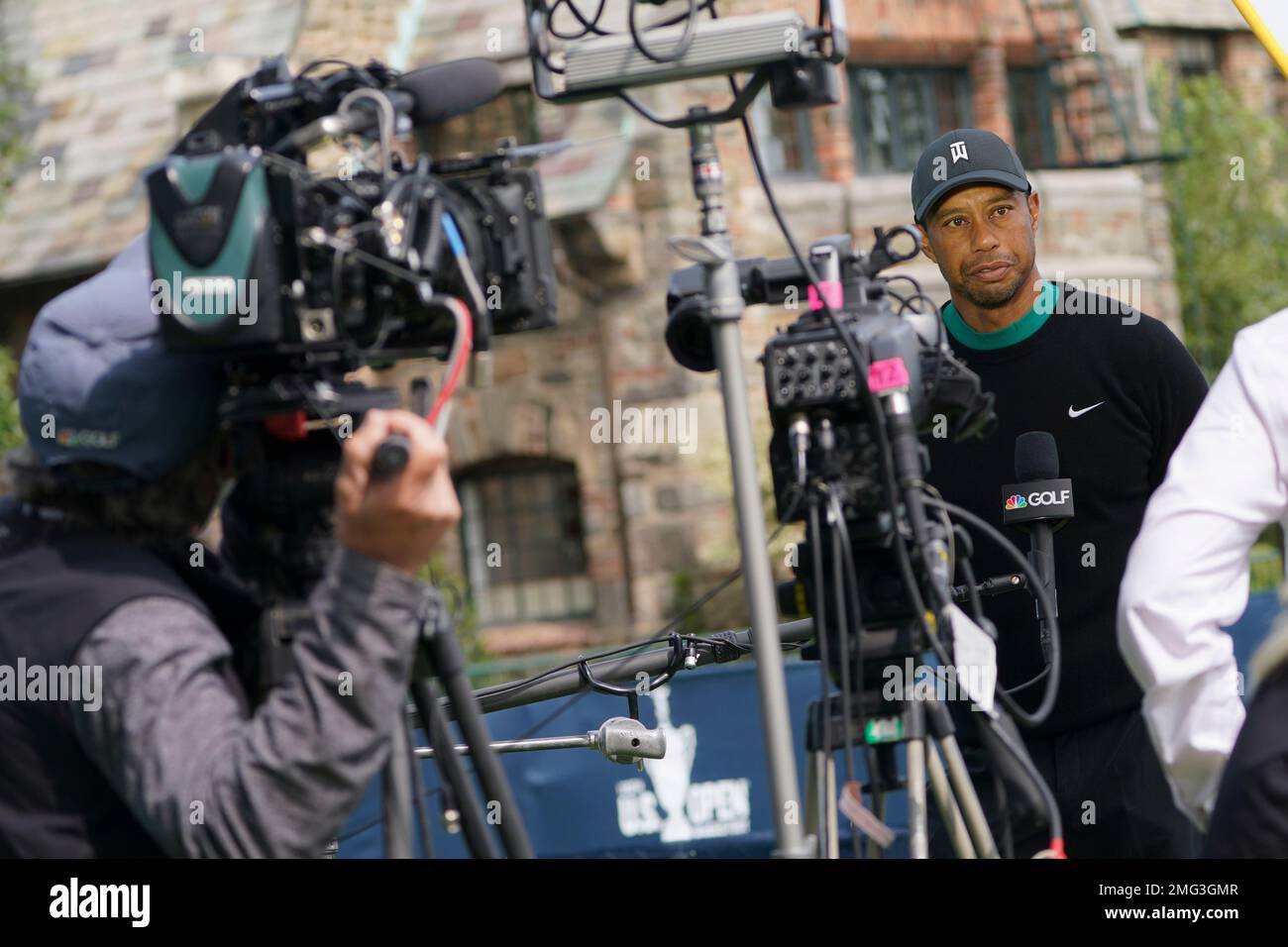 Tiger Woods is interviewed during practices before the U.S. Open ...