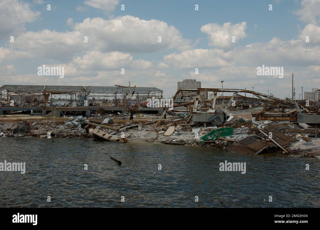 Aftermath - Miscellaneous - 26-HK-48-4. large debris pile and damaged ...