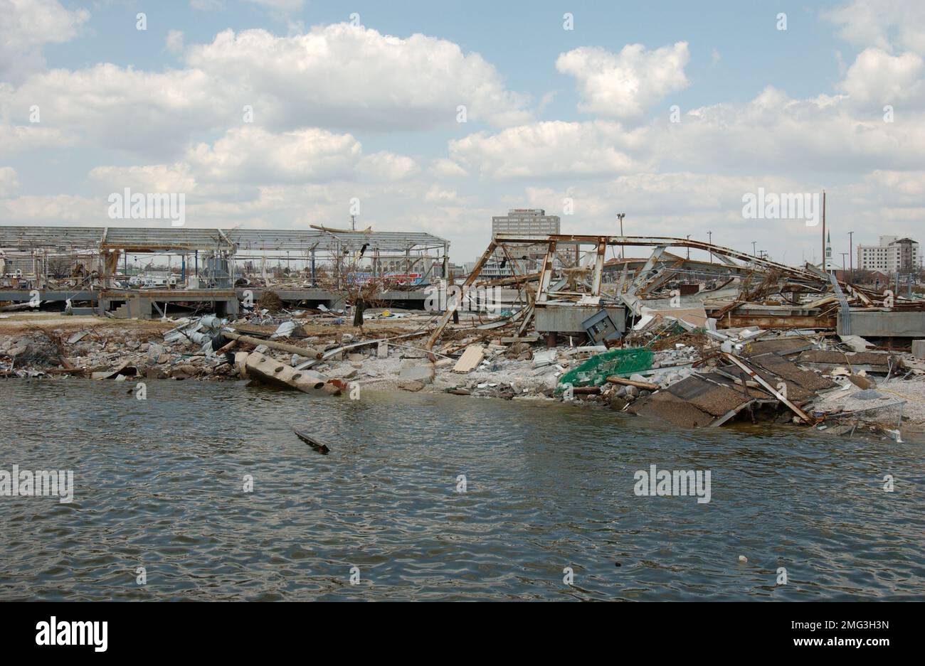 Aftermath - Miscellaneous - 26-HK-48-3. large debris pile and damaged ...