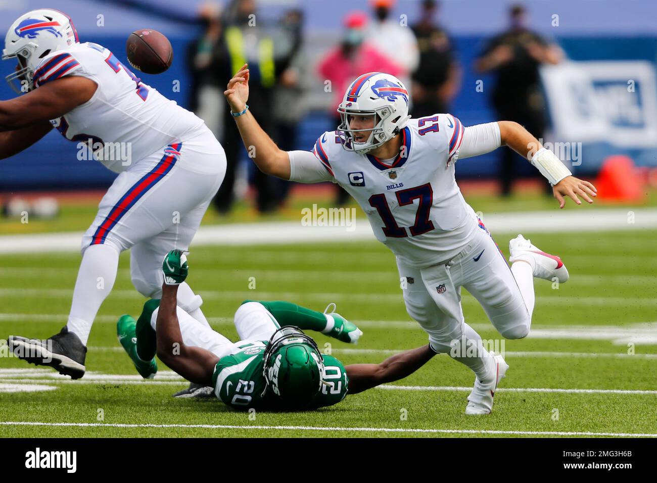 Buffalo Bills quarterback Josh Allen (17) fumbles the ball during the ...