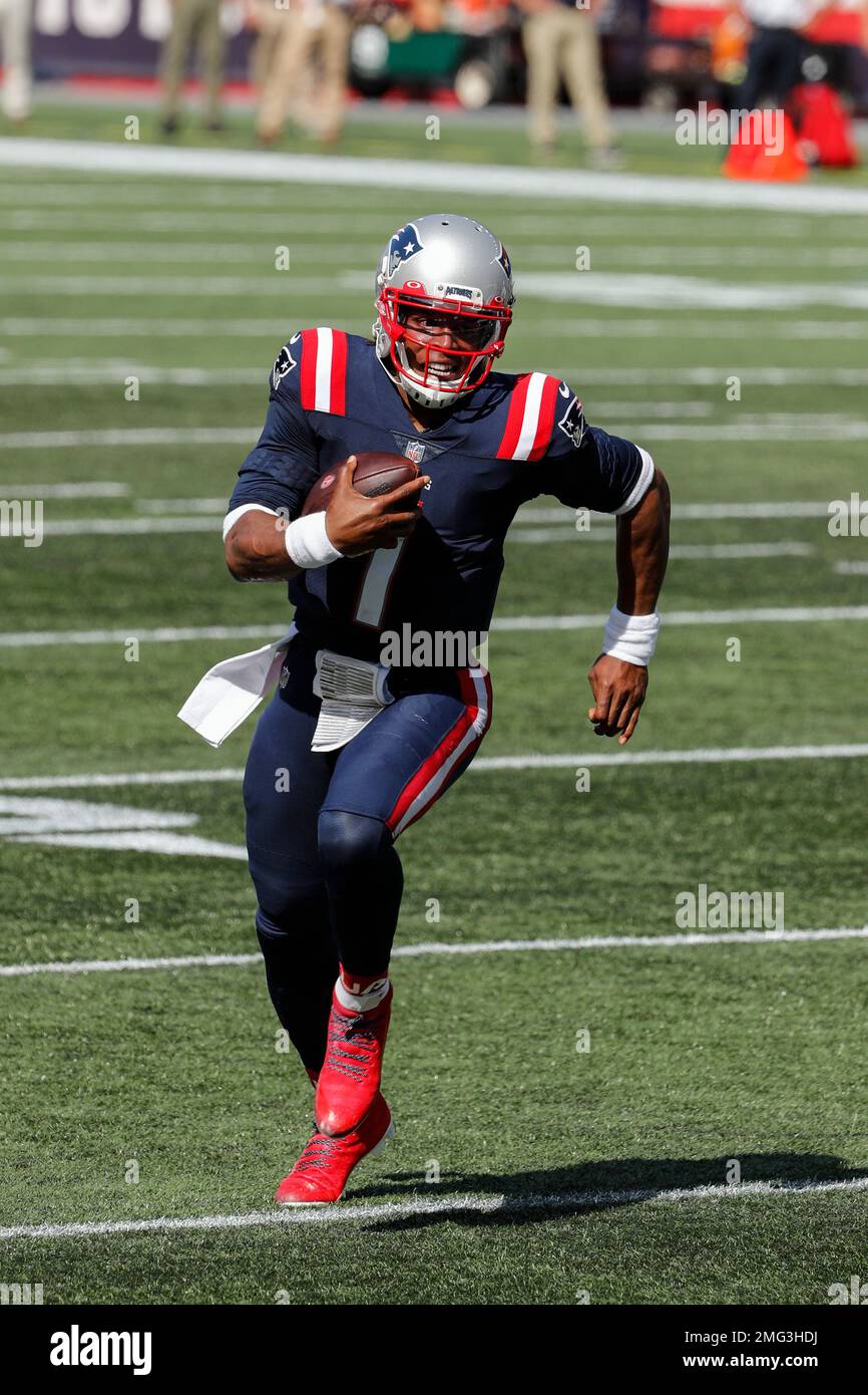 New England Patriots Quarterback Cam Newton Runs The Ball Against The