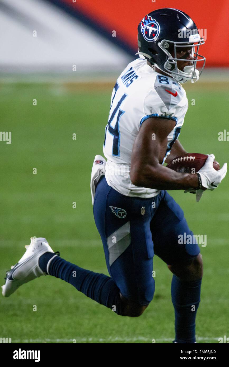 Tennessee Titans wide receiver Corey Davis (84) runs with the football ...
